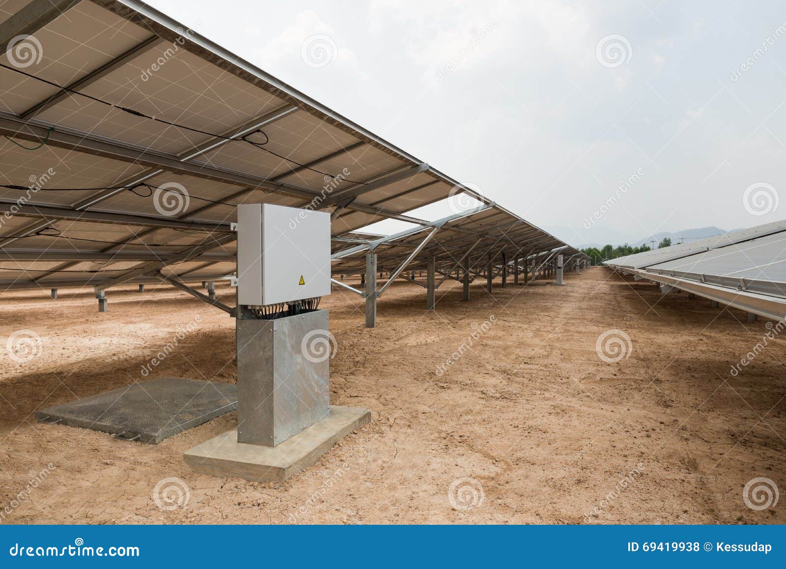 The Control Box of Solar Farm for Green Energy in the Field Stock Photo ...