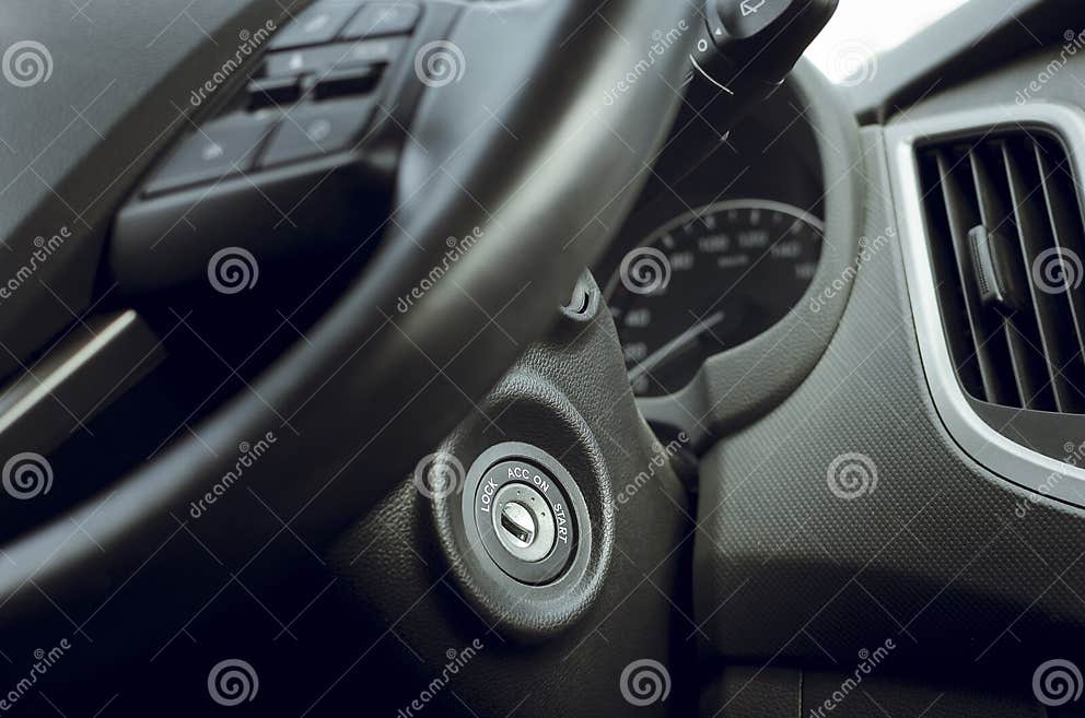 Control Buttons and Ignition Switch on the Car Steering Wheel Stock ...