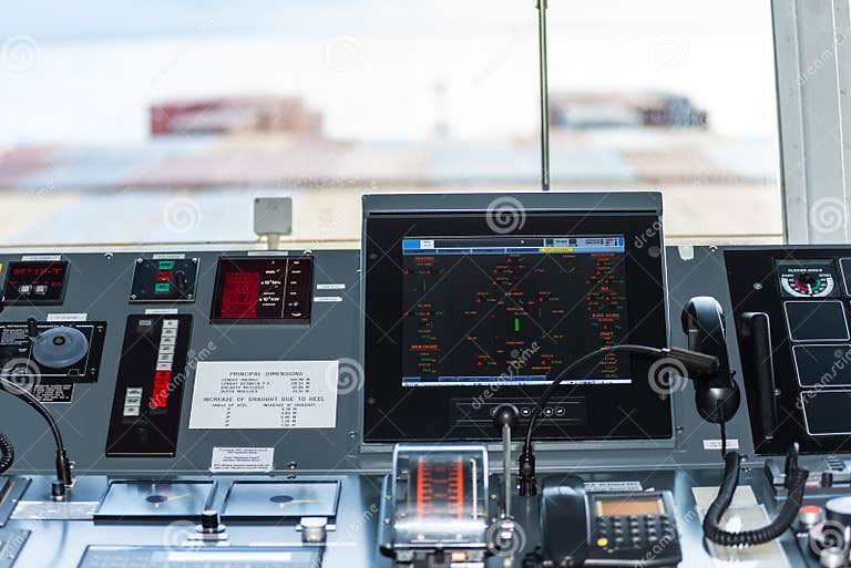 A Control Console Filled with Navigation Instruments Aboard a Large ...
