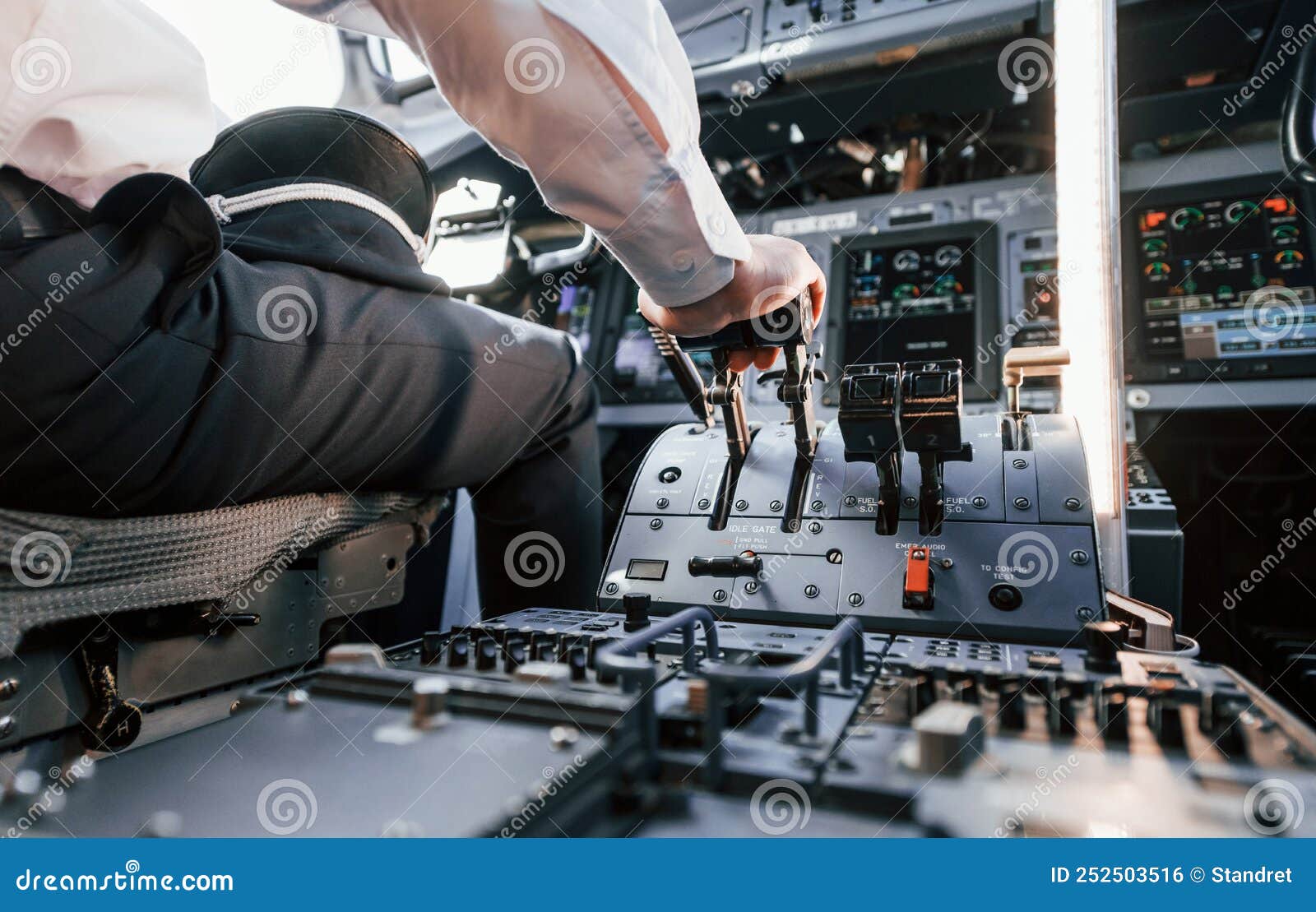 Control of the Flight. Pilot on the Work in the Passenger Airplane ...