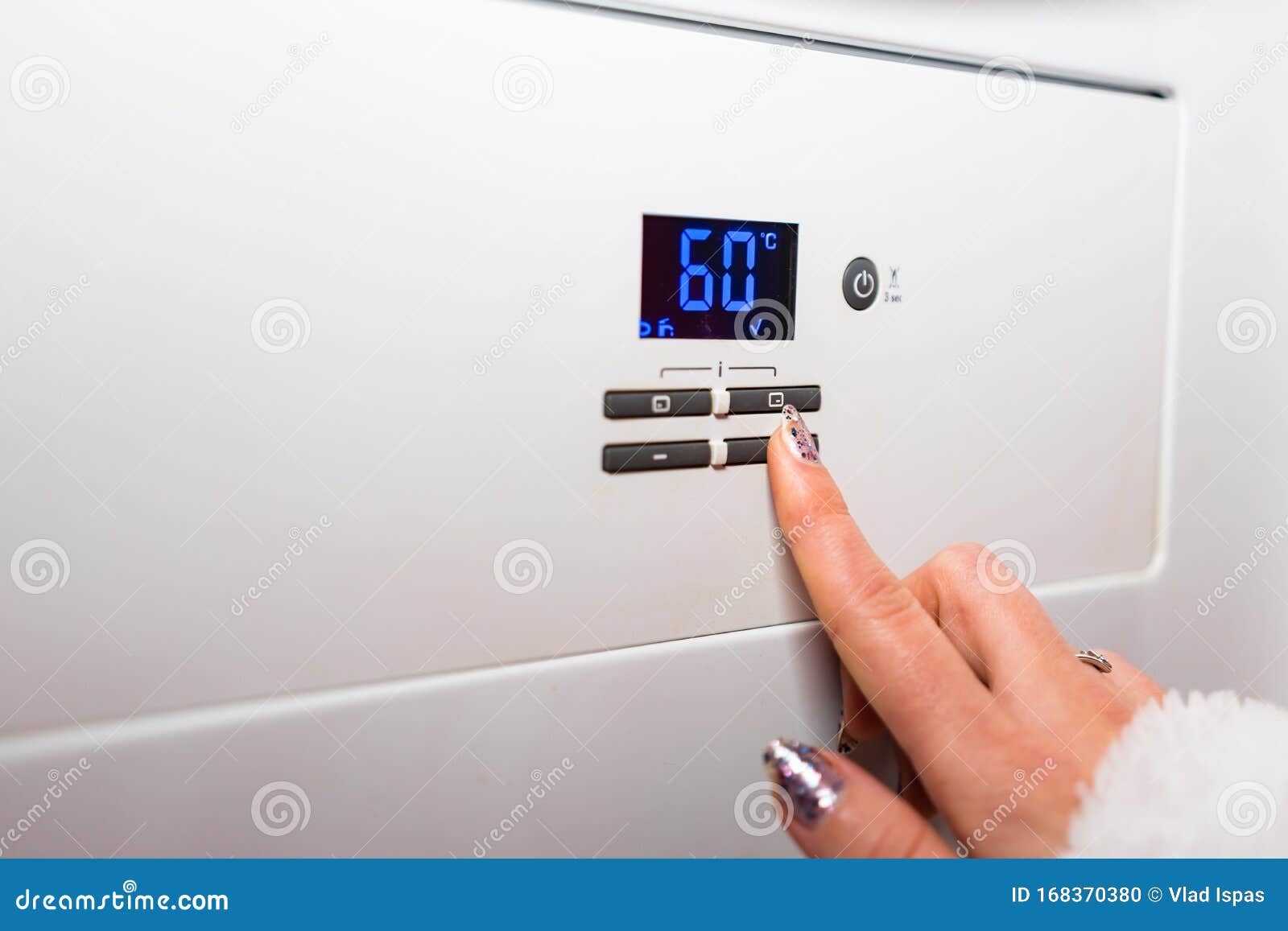 Control Panel of Central Heating. Hand Adjusting the Room Temperature ...