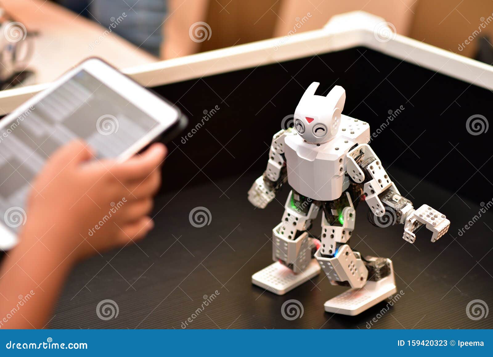 Control a Robot.Move a Robot Stock Image - Image of caucasian ...