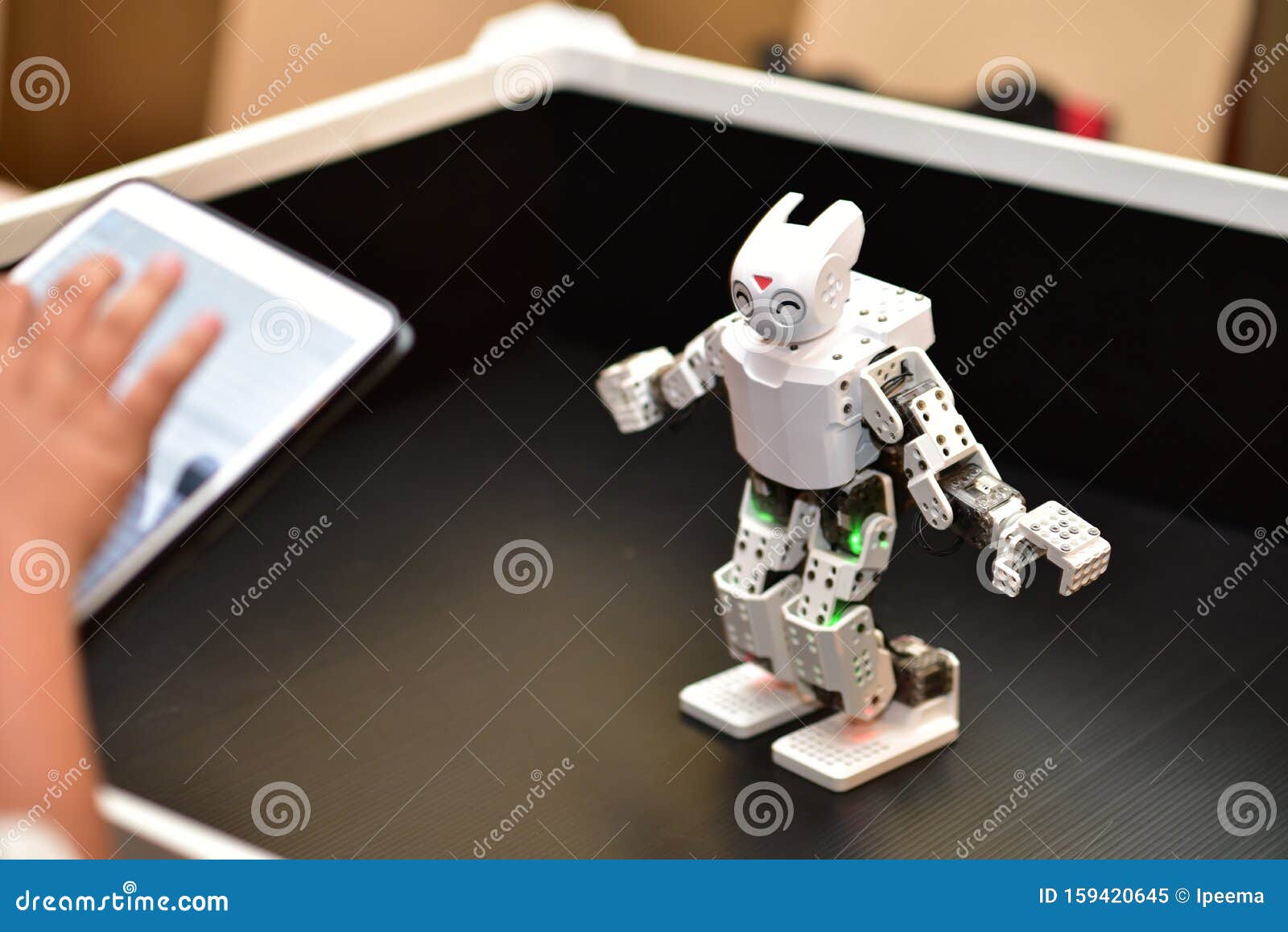 Control a Robot.Move a Robot Stock Image - Image of game, machine ...