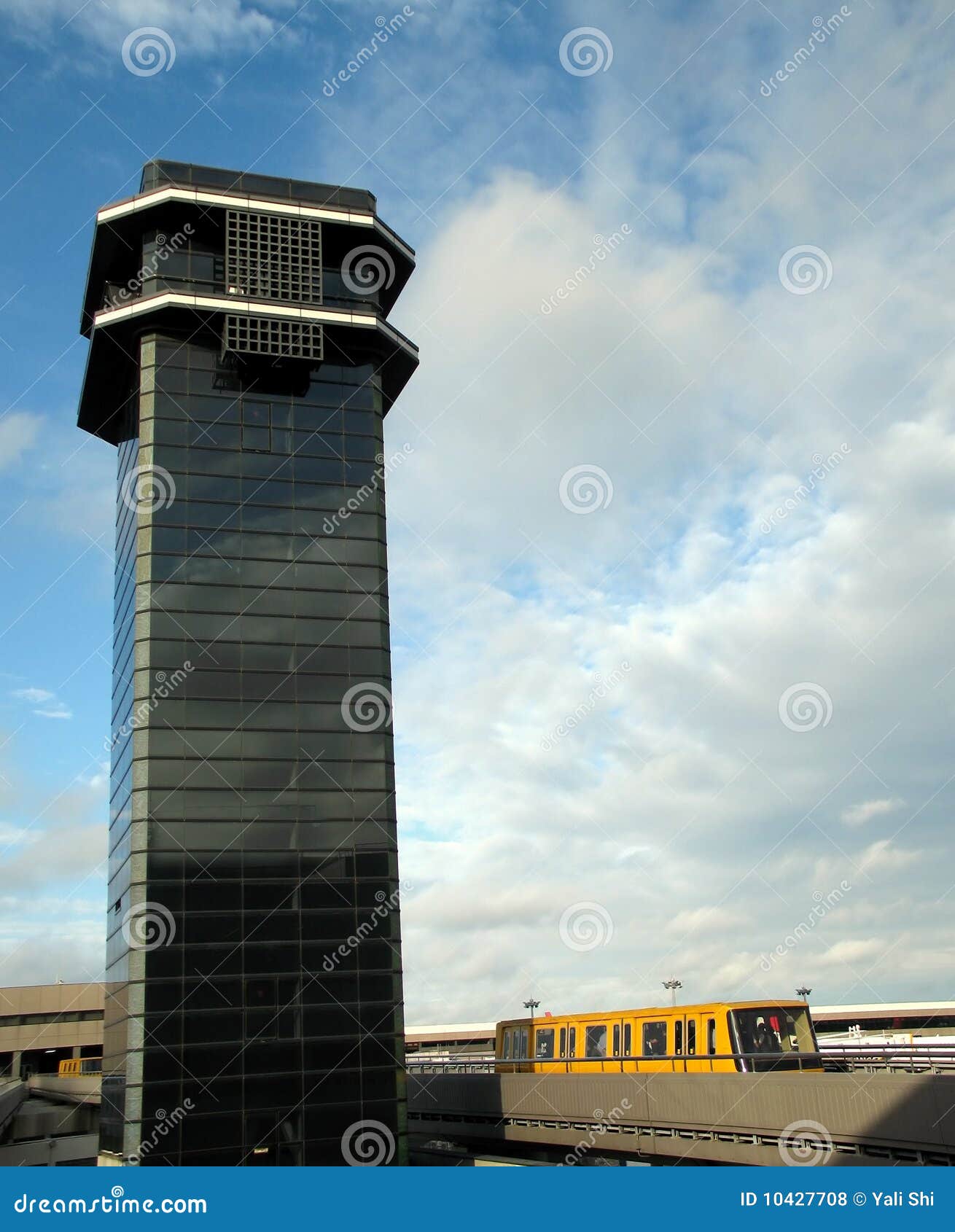 Control Tower and Airport Shuttle Stock Photo - Image of black, clouds ...