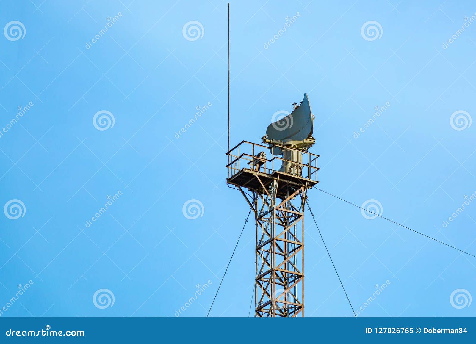 Control Tower with Radar Antenna and Navigation Equipment Against the ...