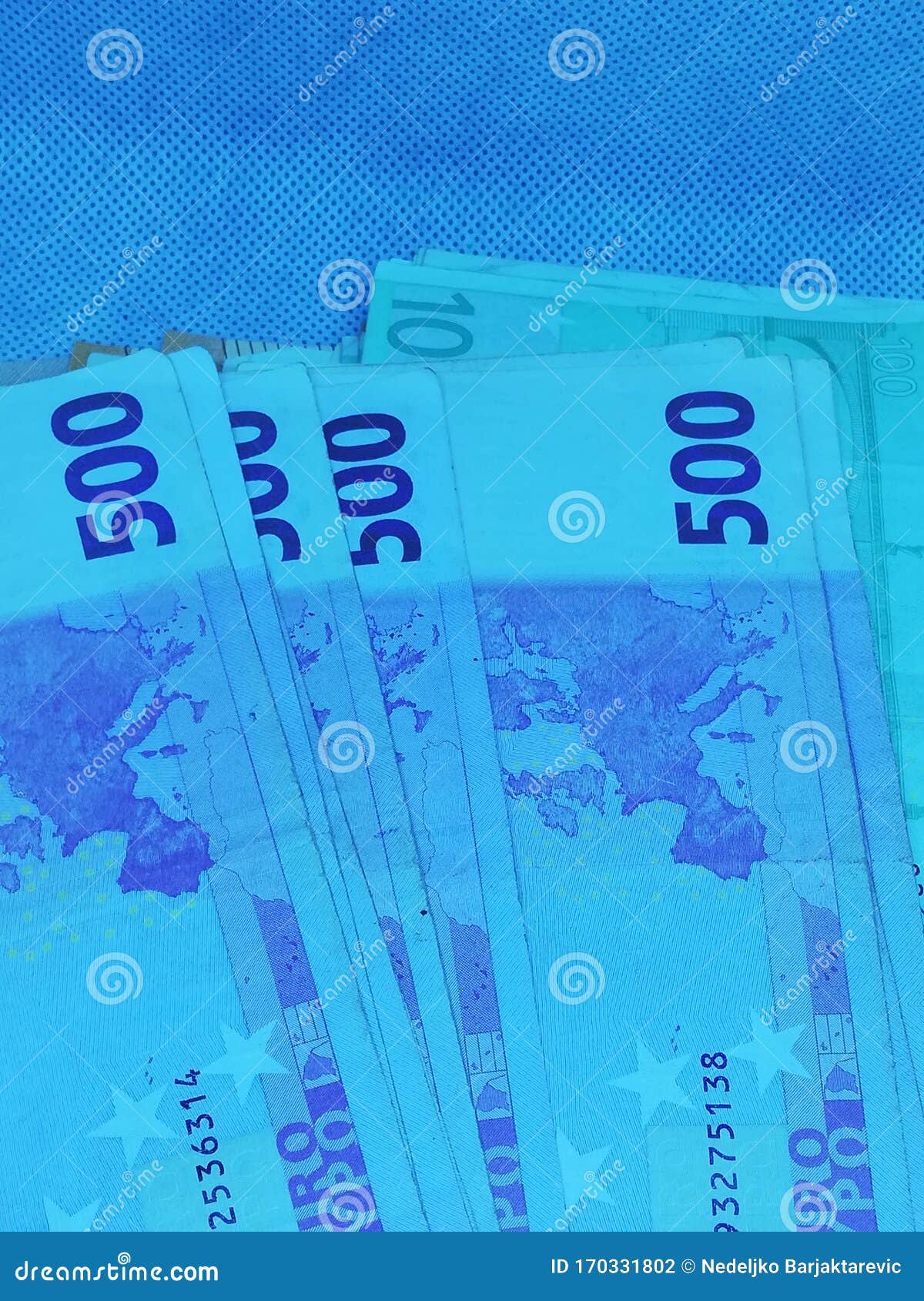Control UV Rays More Banknotes of 500 and 100 Euros on a Bright Blue ...