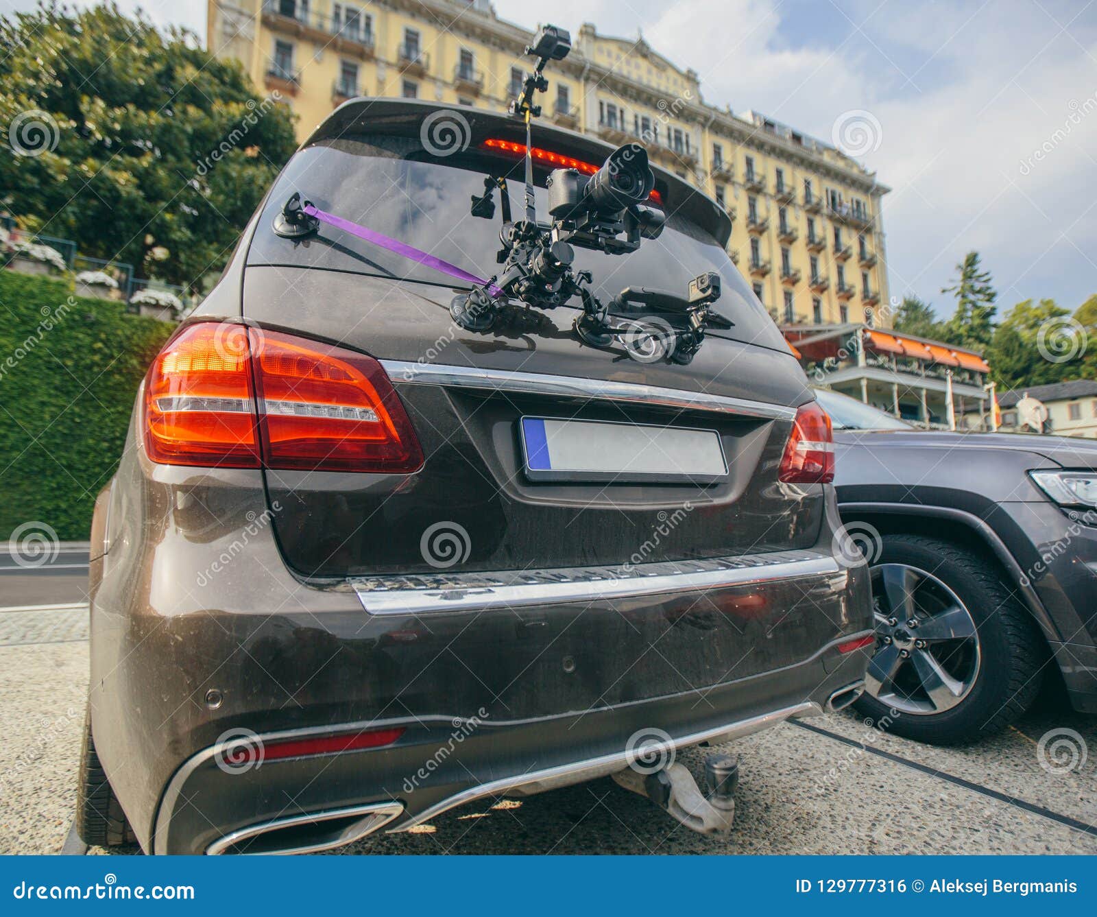 Camera Gimbal on the Car Steadicam Keeps on Suckers on the Auto Car ...