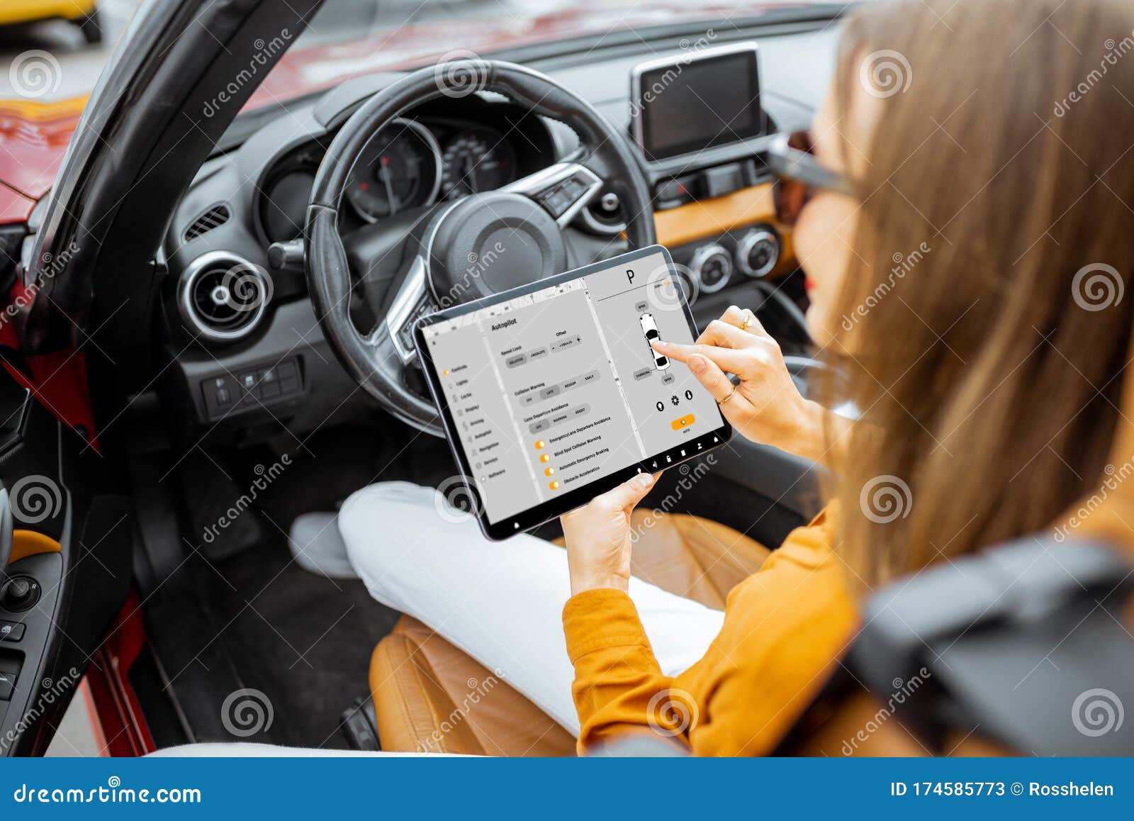 Controlling Car with a Digital Tablet Stock Image - Image of people ...