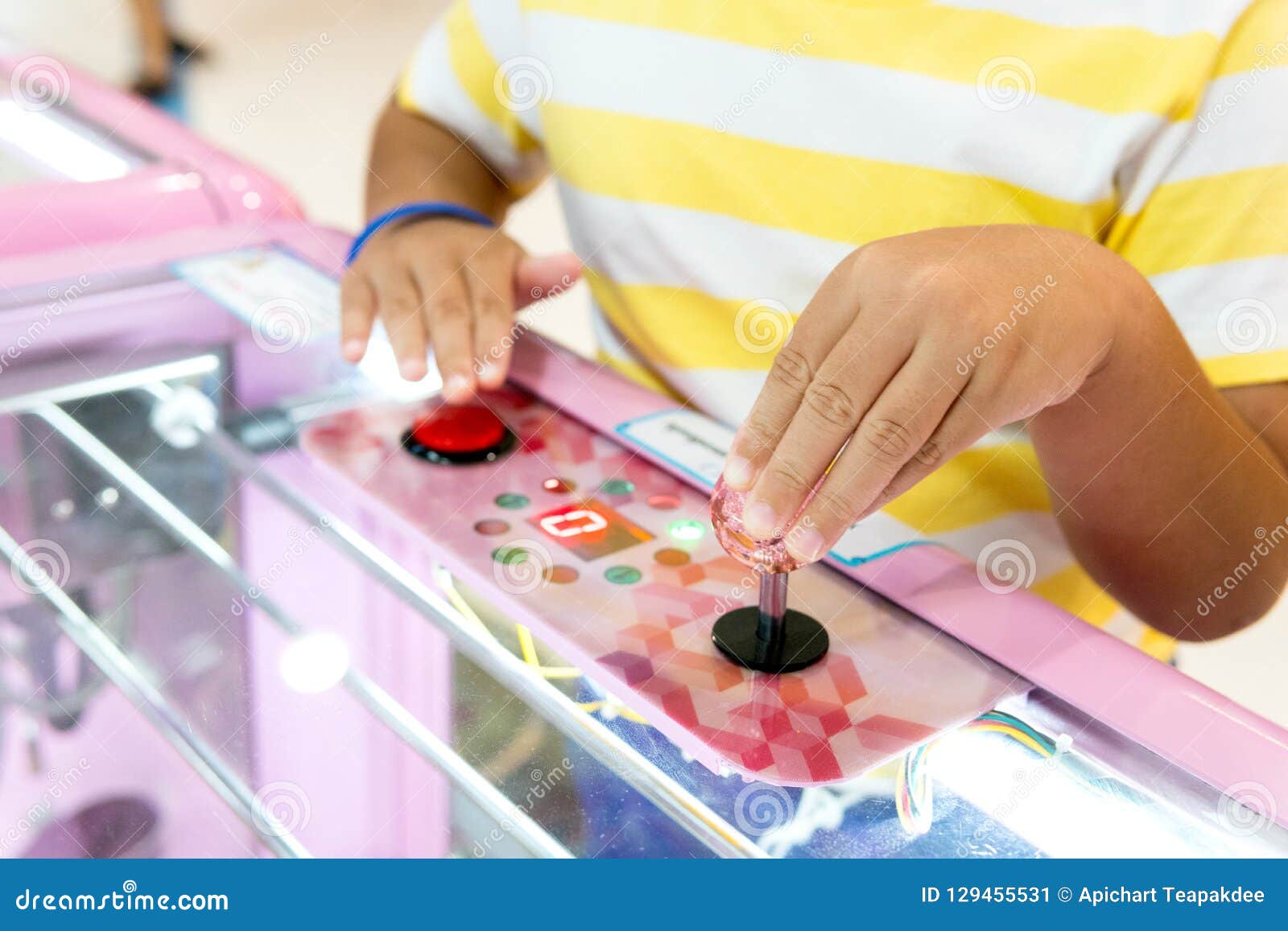 Controlling Crane Game Machine Stock Image - Image of joystick, boys ...