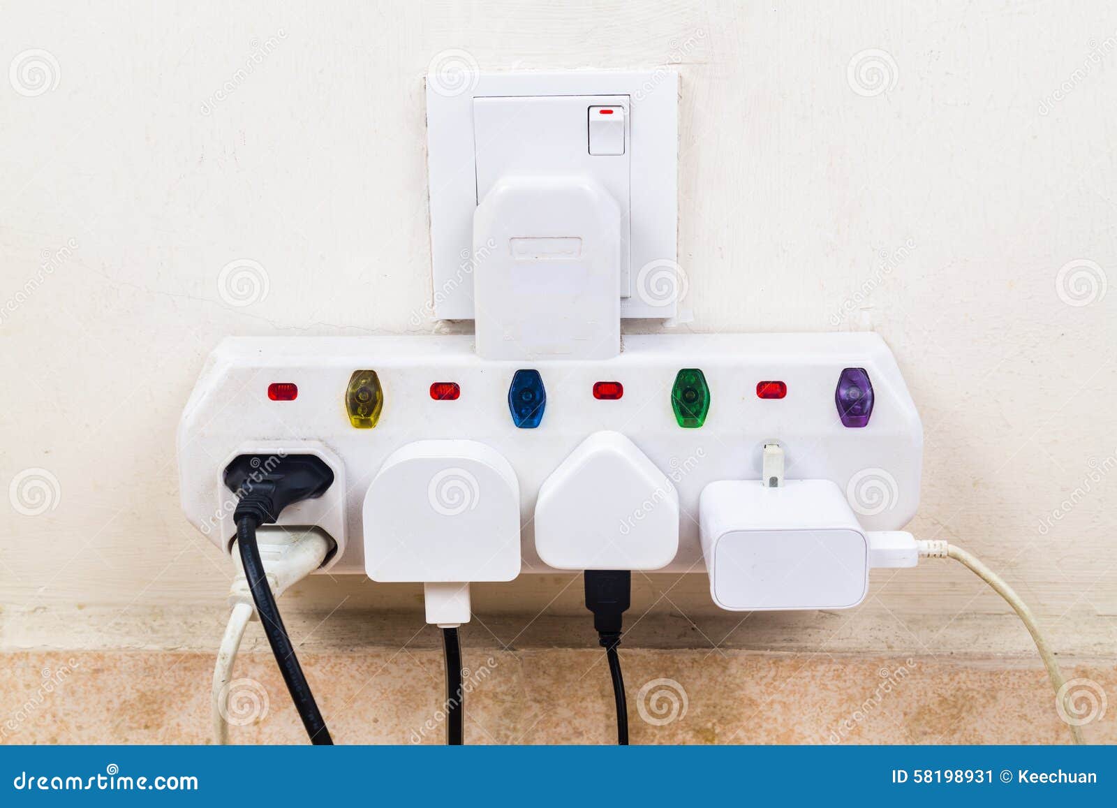 Convenient Multiple Electricity Plugs Attached To Multi Adapter Stock ...
