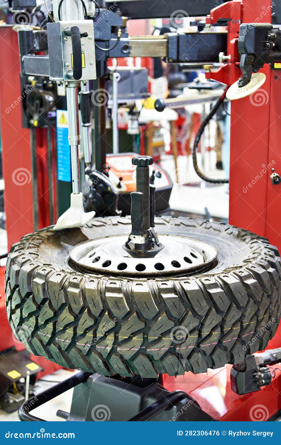 Automatic tire changer stock photo. Image of workshop - 282306476