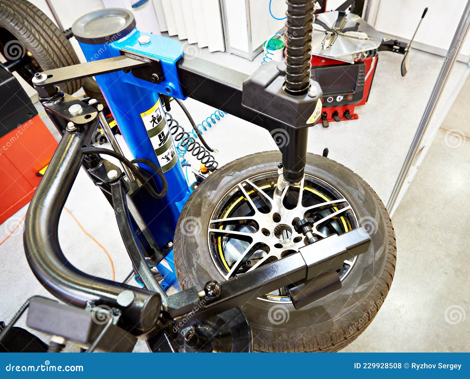 Tire changer wheel stock photo. Image of changer, maintenance - 229928508
