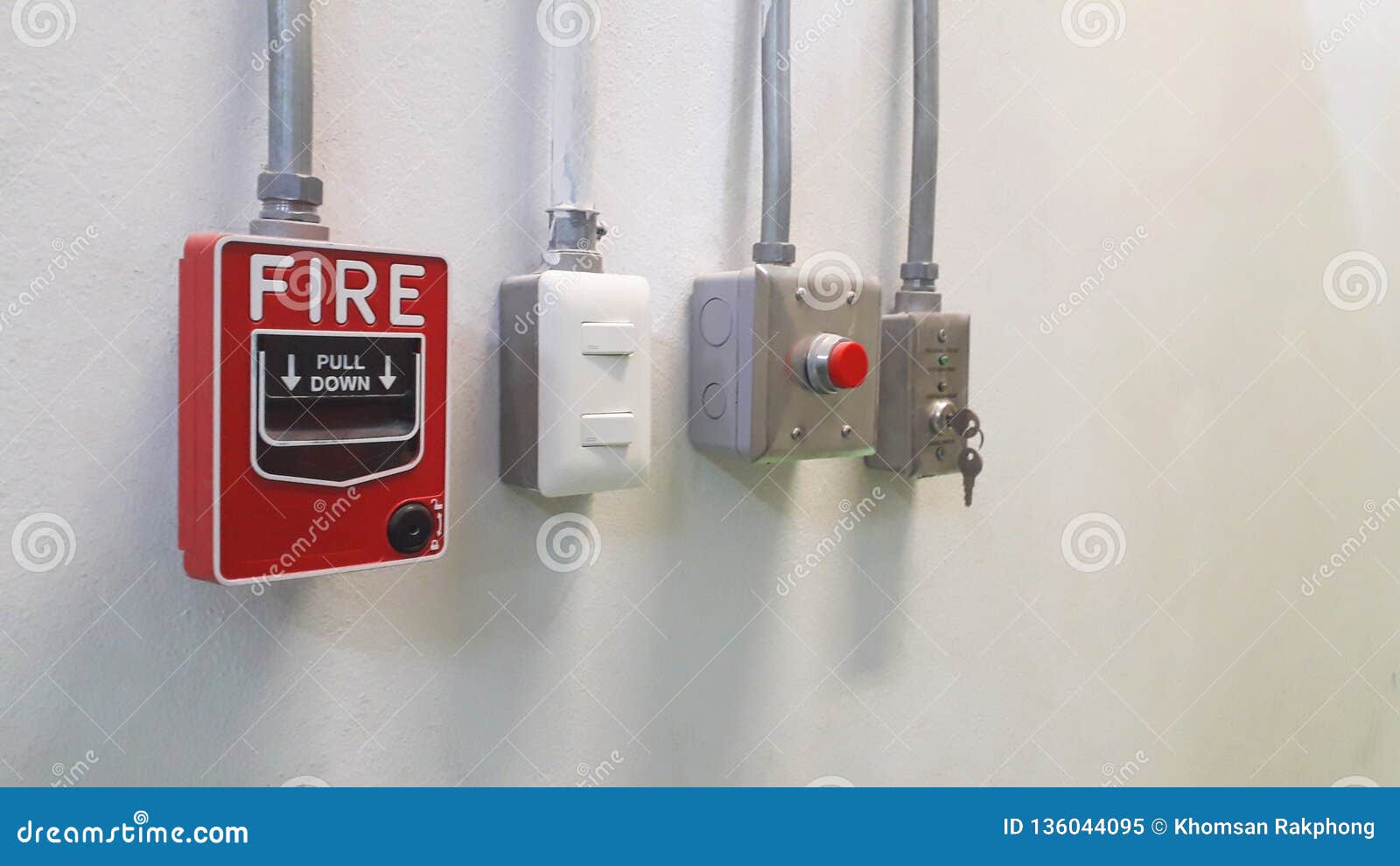 Fire Alarm Pull Stations and Emergency Switch on the Wall Stock Image ...