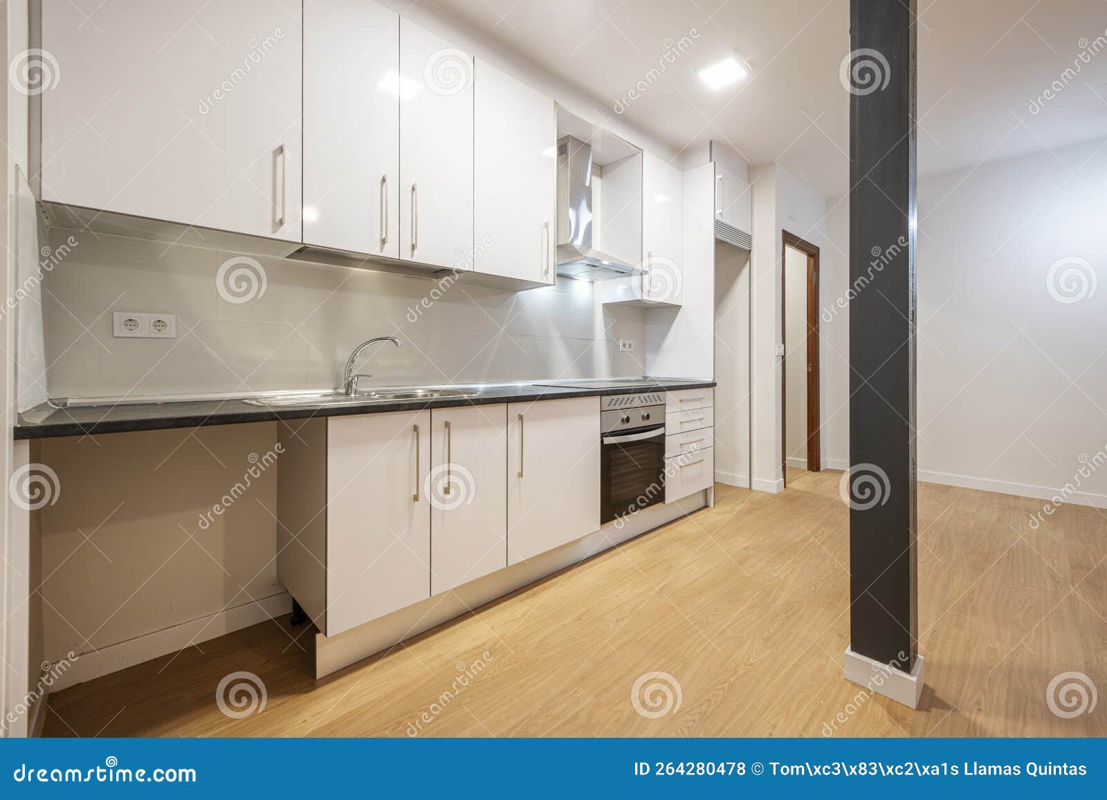 Conventional Kitchen Cabinets Just Installed in an Open Kitchen with a ...