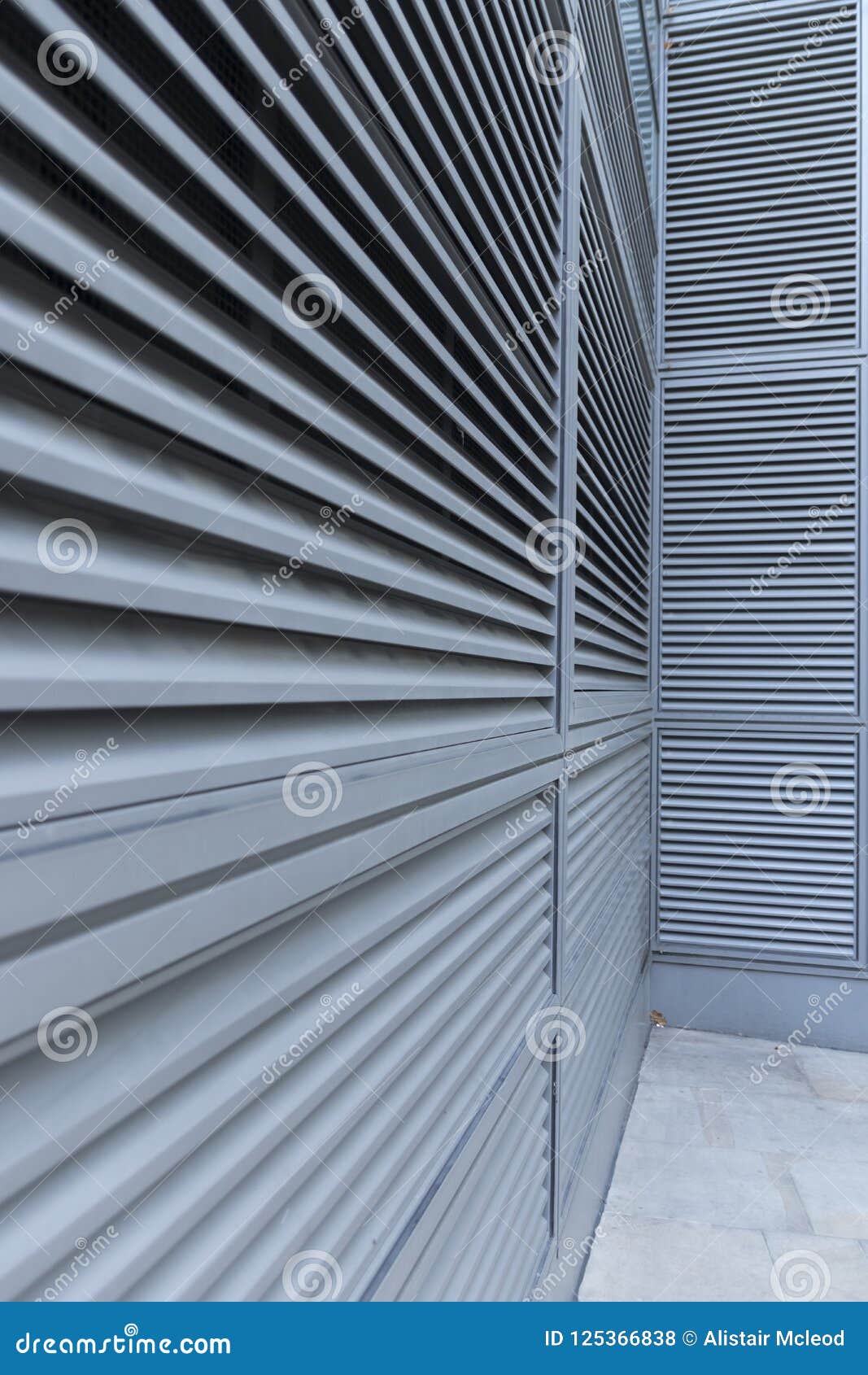 Converging Lines on an Office Building Grilled Cladding Stock Photo ...