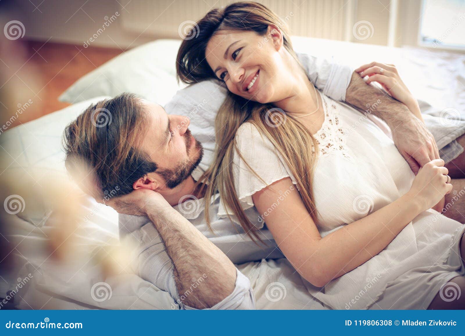 Conversation in bed. stock photo. Image of life, bonding - 119806308
