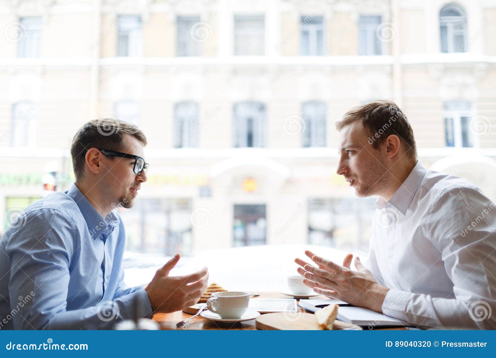 Conversation of co-workers stock photo. Image of negotiation - 89040320