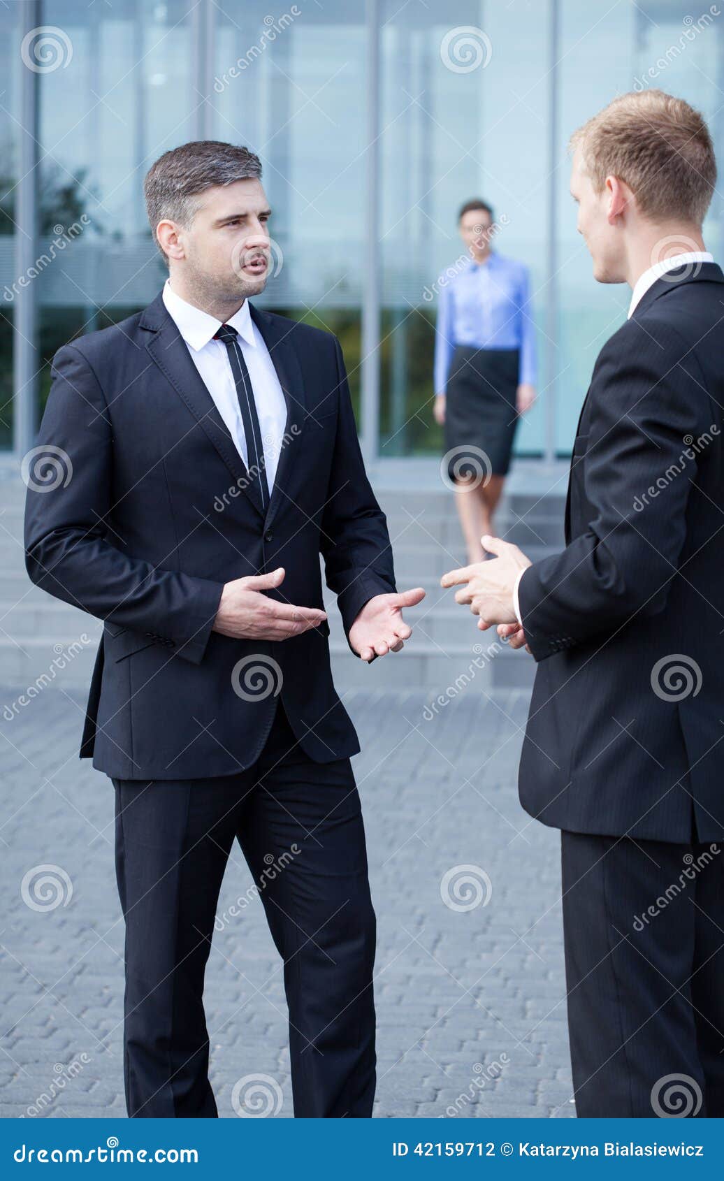 Conversation in Front of Business Centre Stock Photo - Image of ...