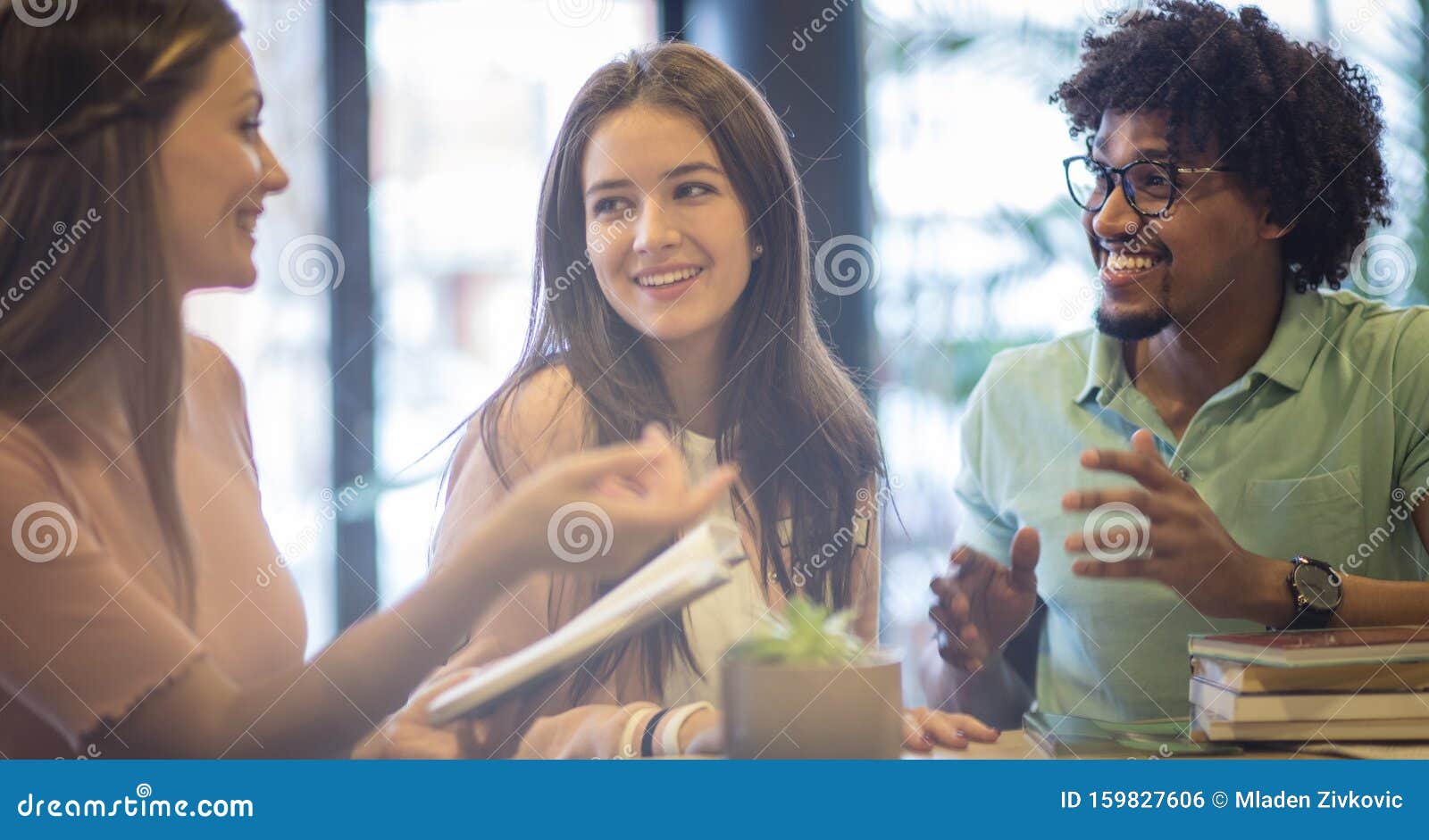 Conversation between Learning Stock Photo - Image of chatter, ethnic ...