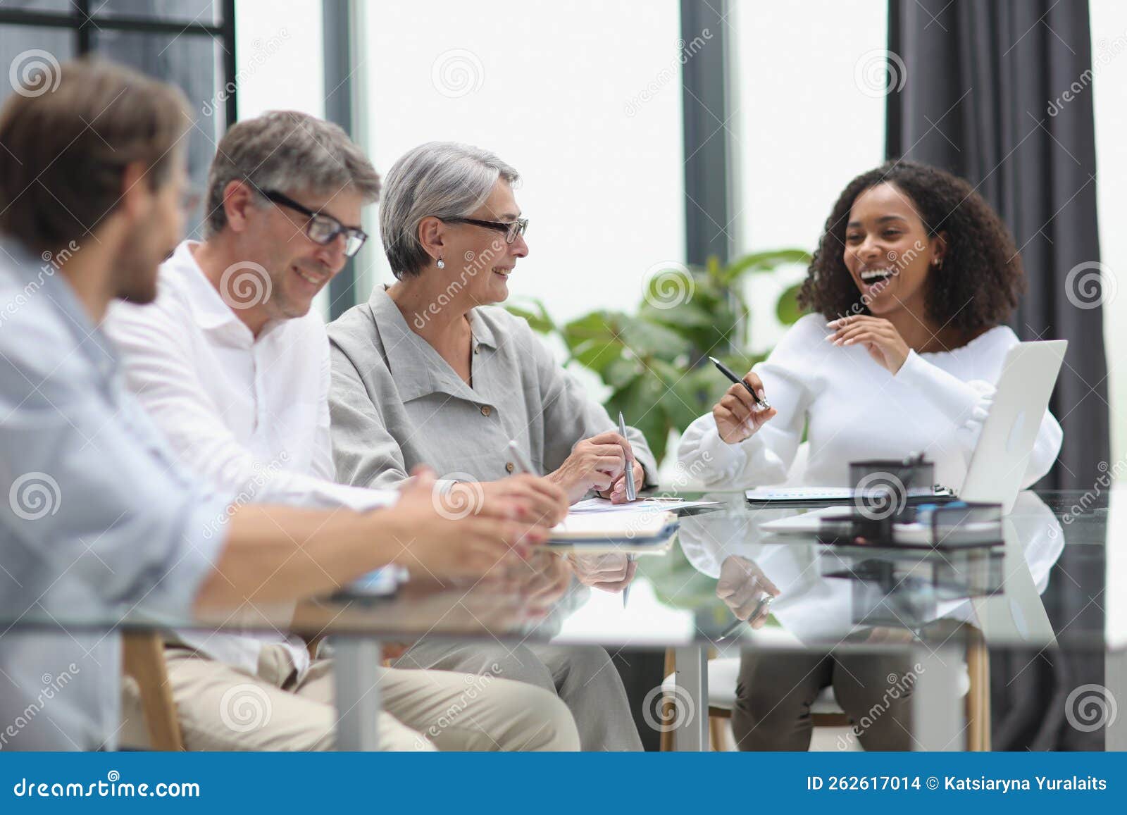 Conversation between Managers and Employees in the Office at the Table ...