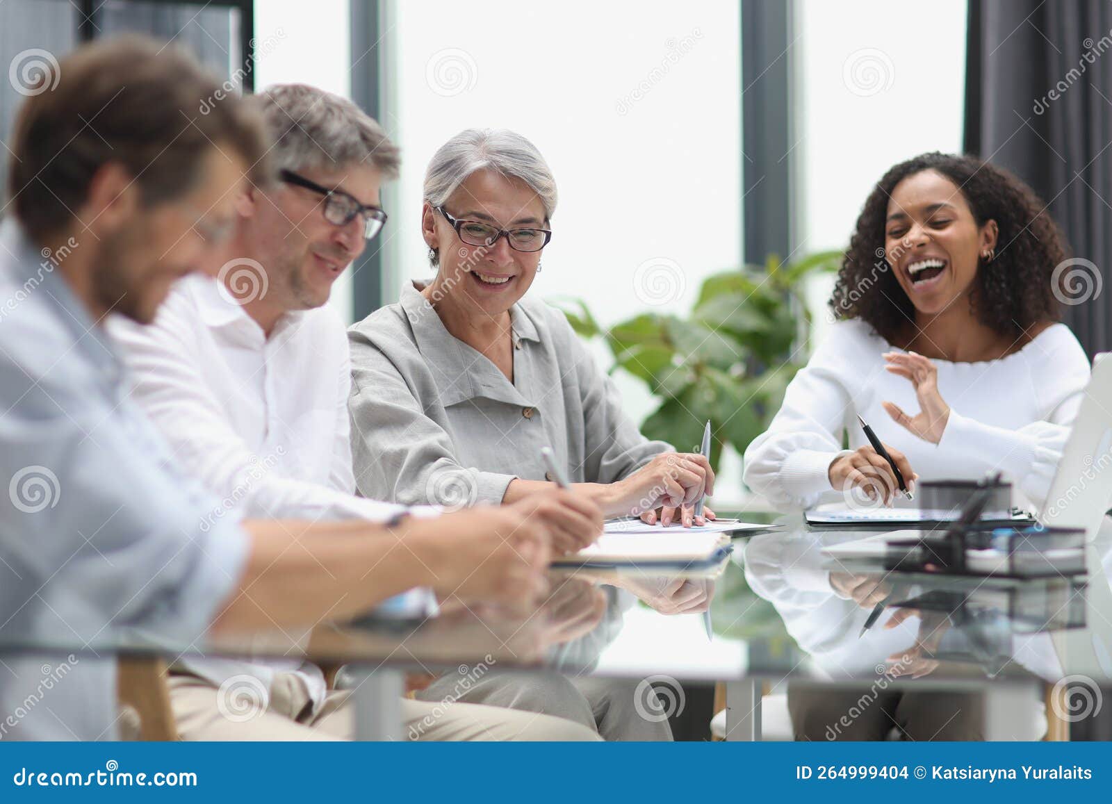 Conversation between Managers and Employees in the Office at the Table ...