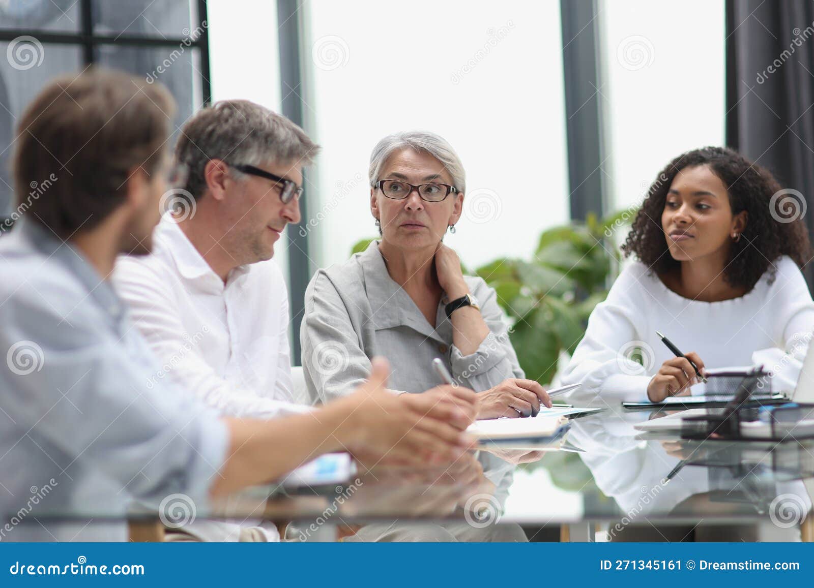 Conversation between Managers and Employees in the Office at the Table ...