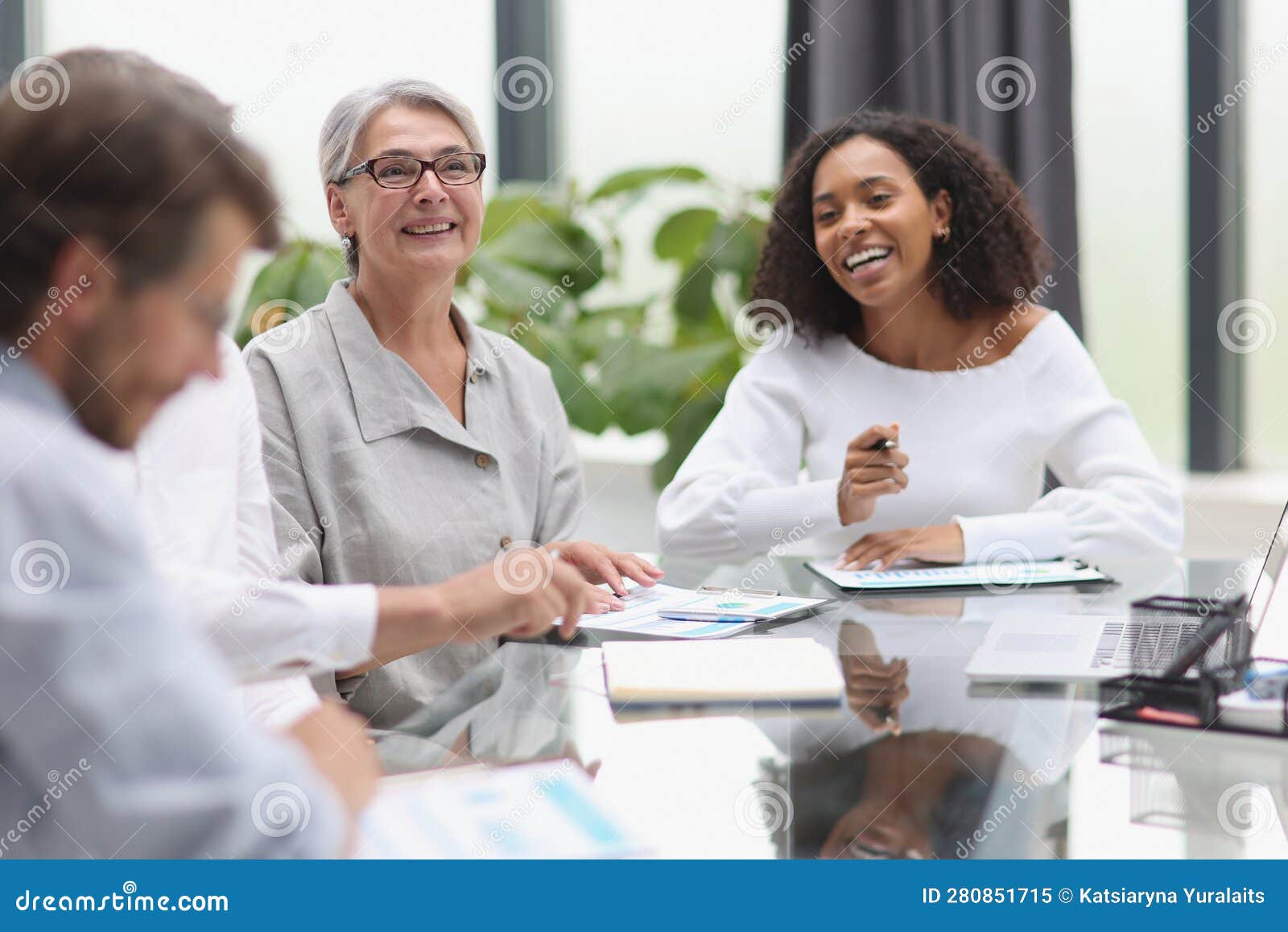 Conversation between Managers and Employees in the Office at the Table ...