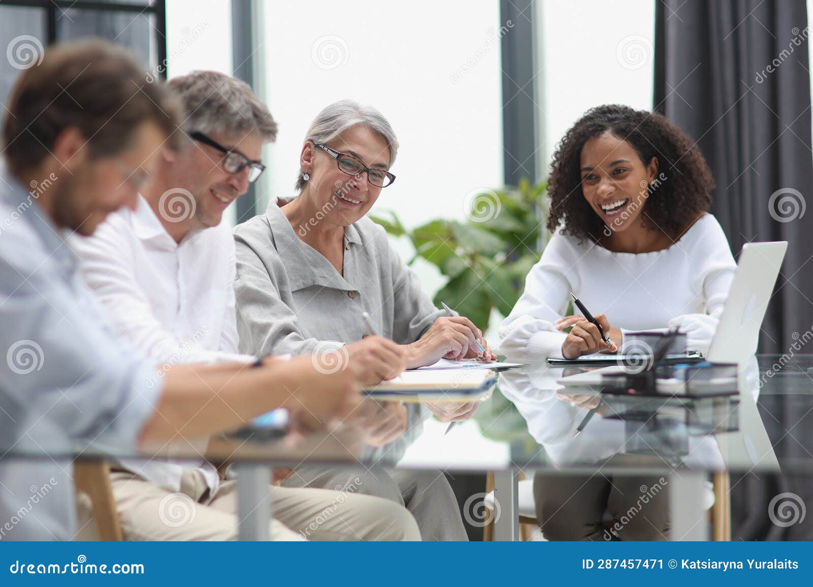Conversation between Managers and Employees in the Office at the Table ...