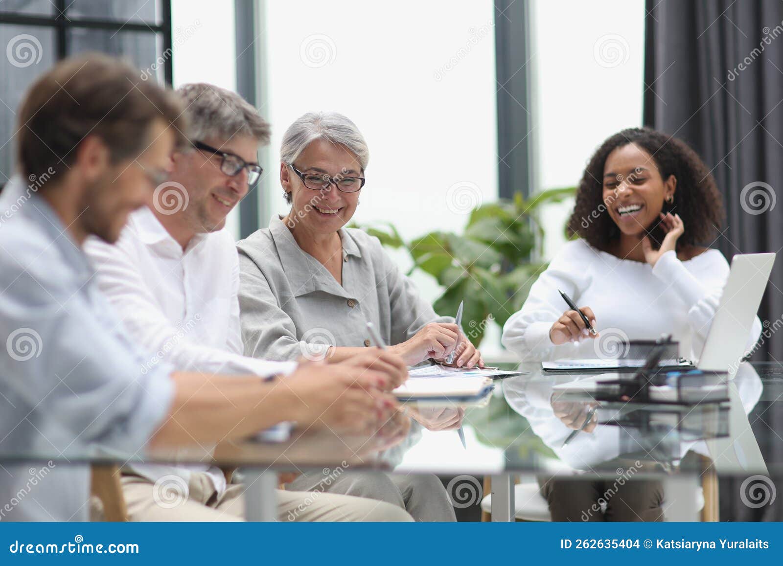 Conversation between Managers and Employees in the Office at the Table ...