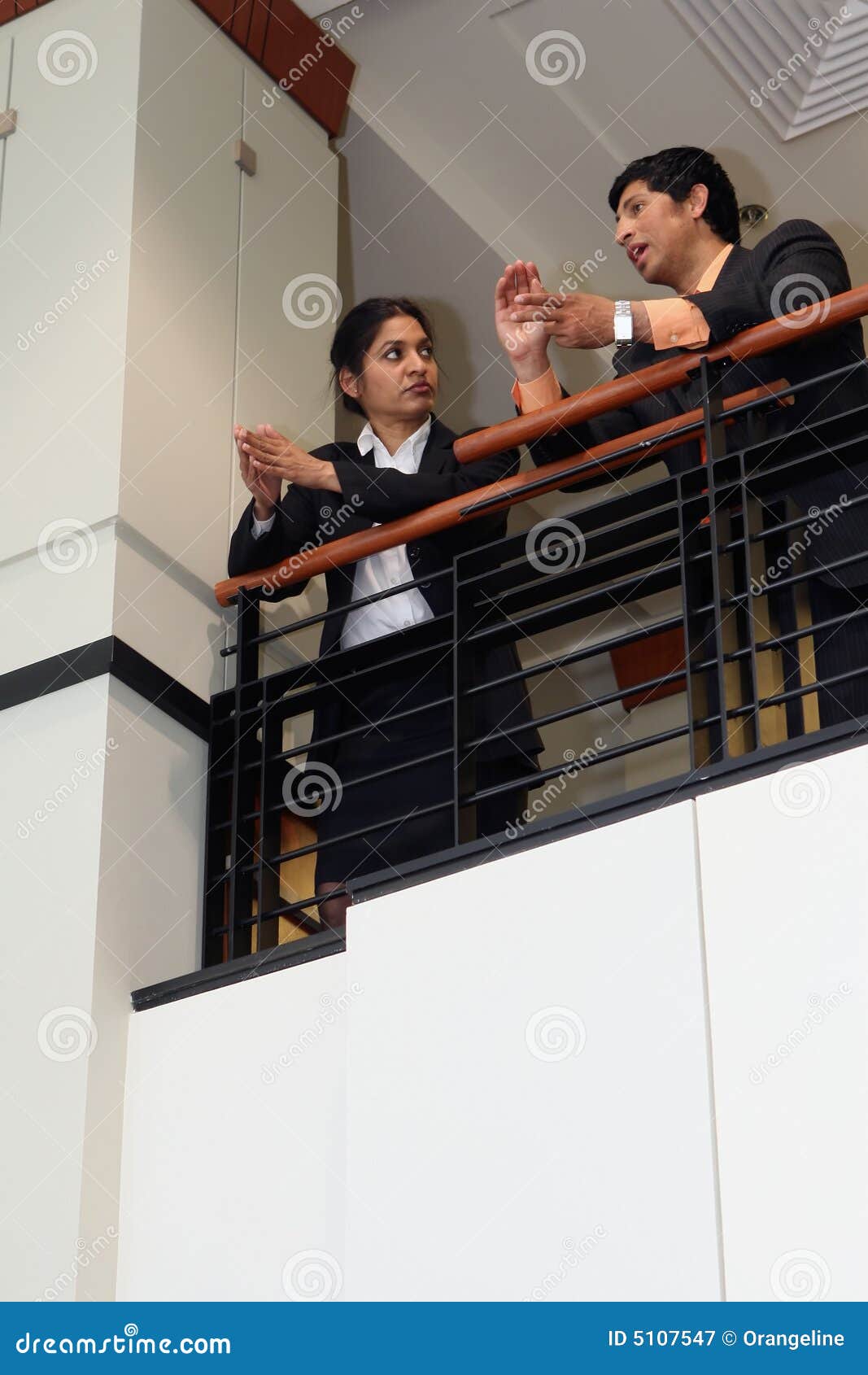 Conversation at Near a Railing - Vertical Stock Image - Image of ...