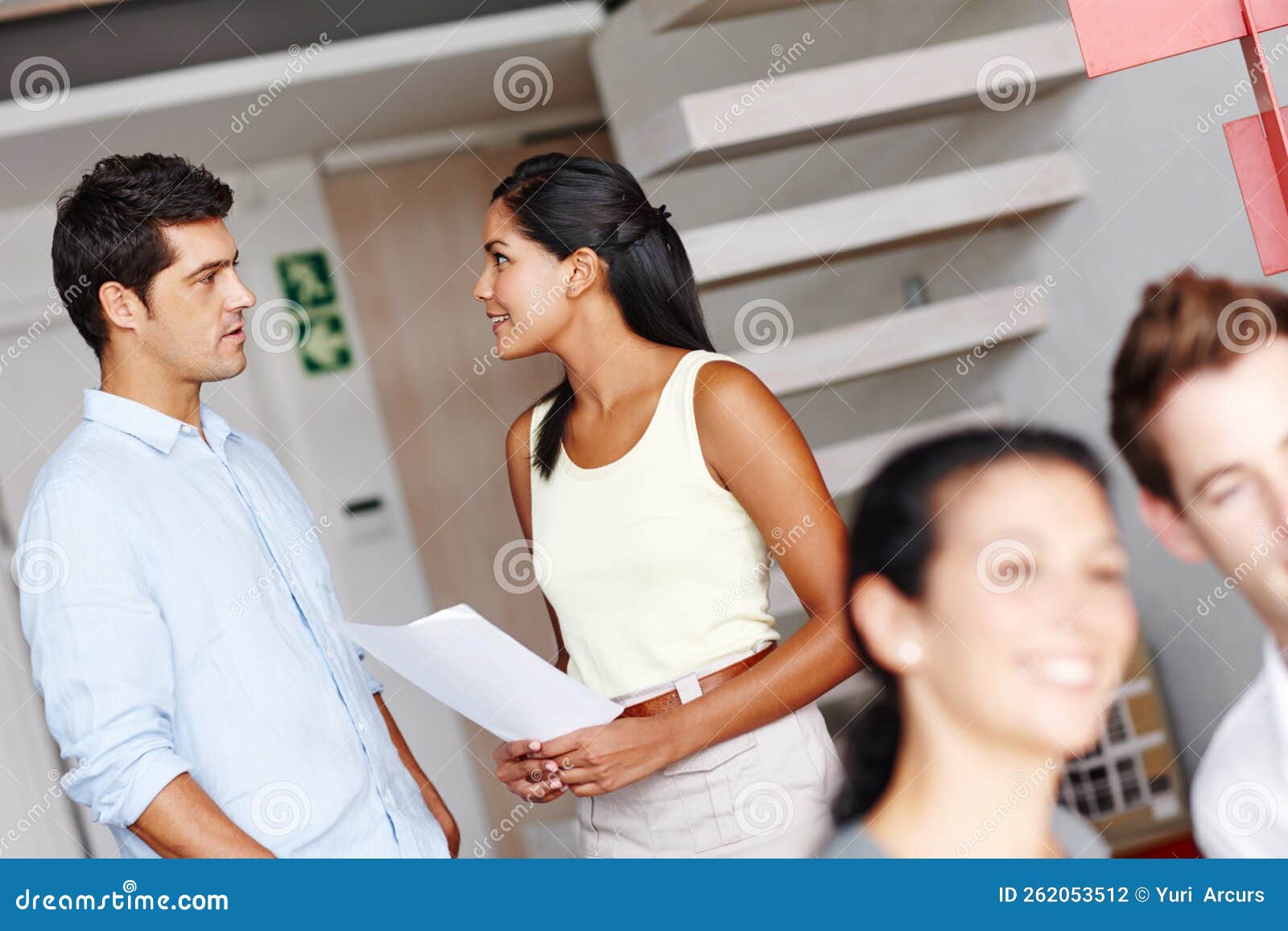 Conversation in the Office. Two Colleagues Discussing a Project Brief ...