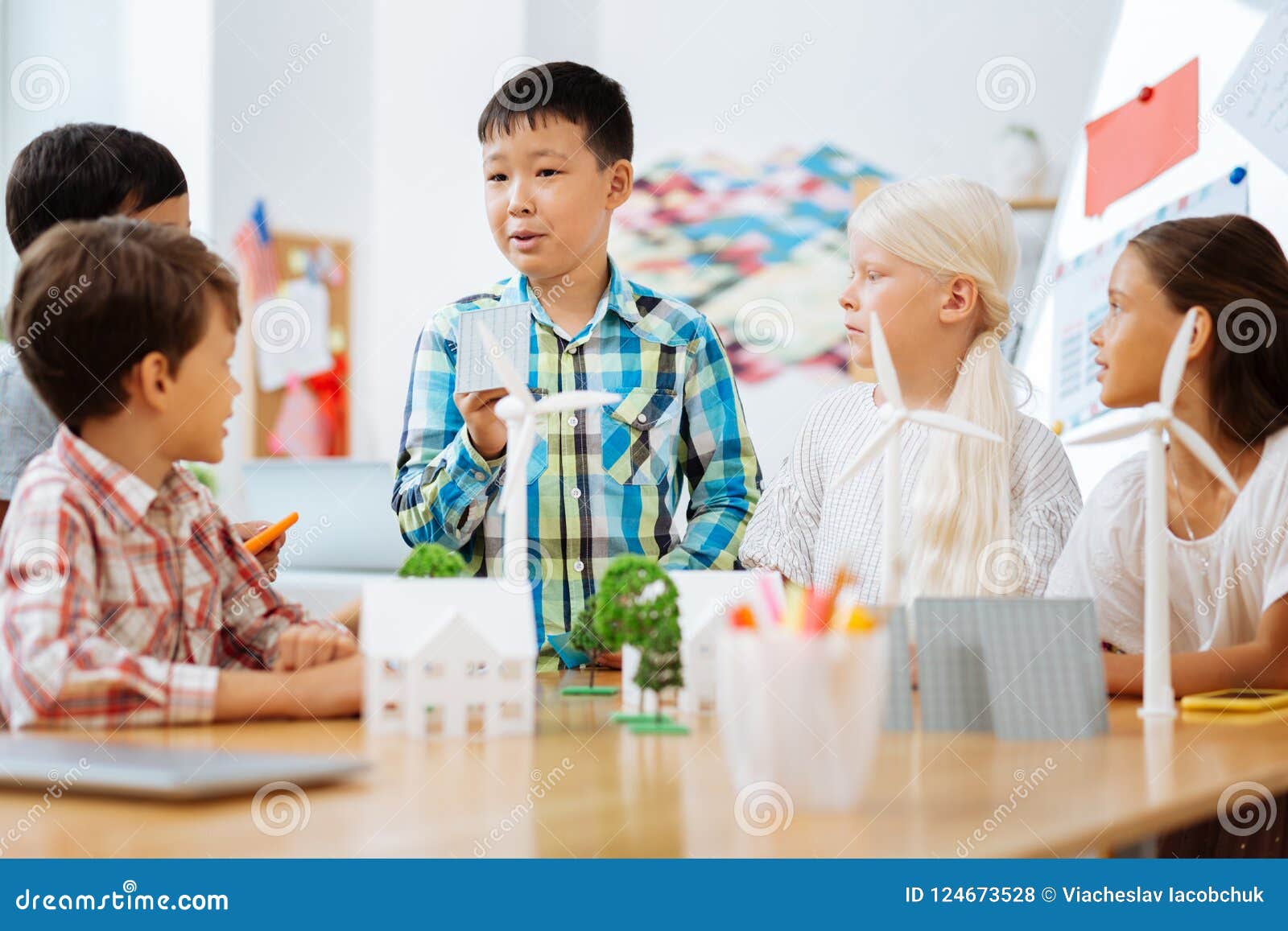 Talkative Boy Speaking with Classmates in a Classroom Stock Photo ...