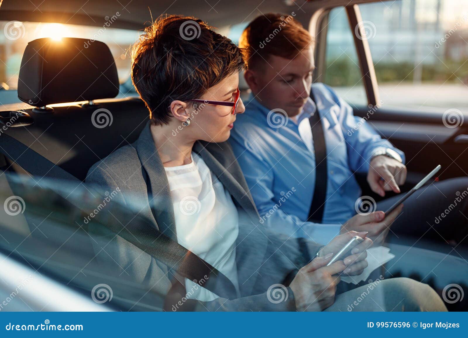 Conversation of Business Colleagues in Driving Car Stock Photo - Image ... Conversation of Business Colleagues in Driving Car Stock Photo - Image ...