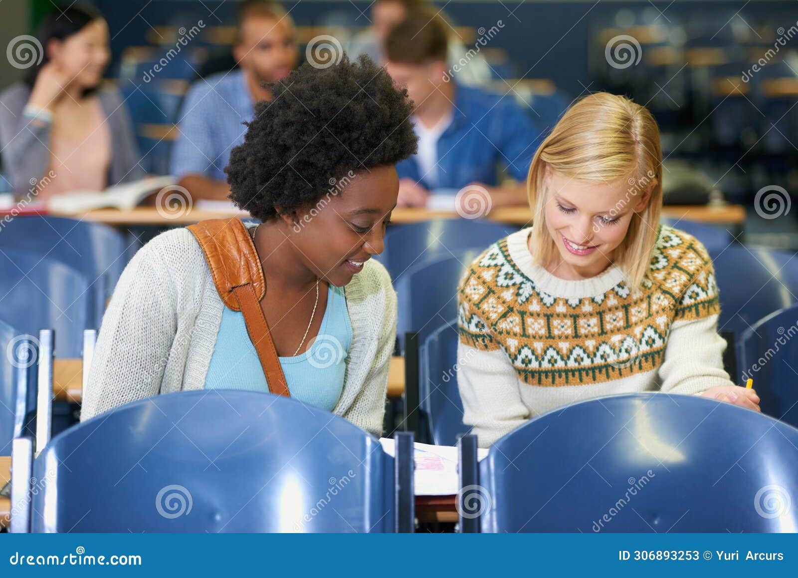 Conversation, University and Women Students in Classroom with Textbooks ...