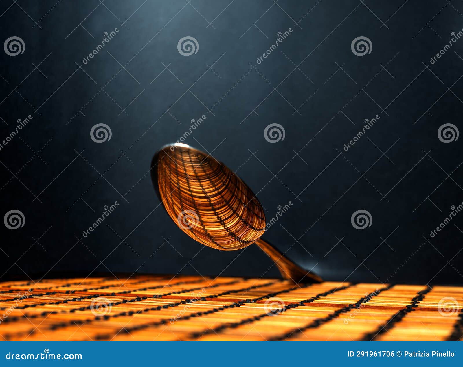 Convex Part of a Suspended Silver Spoon Stock Photo - Image of black ...