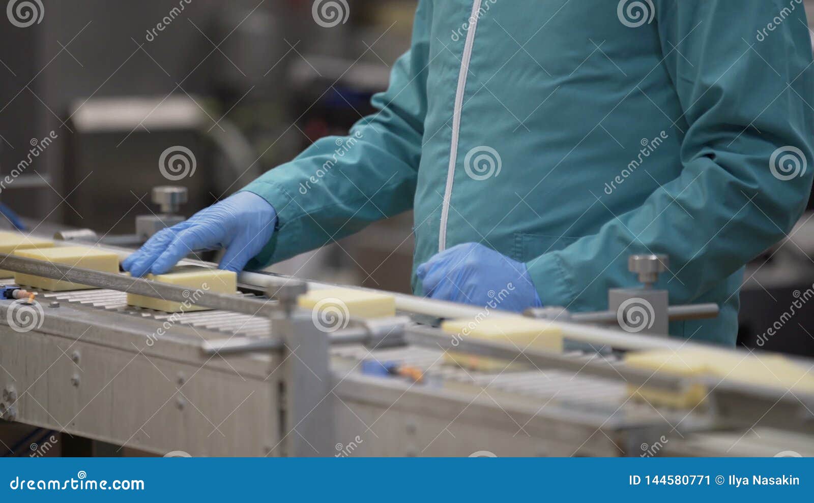 Conveyor Line for Cheese Packaging Process. Close Up of Cheese ...