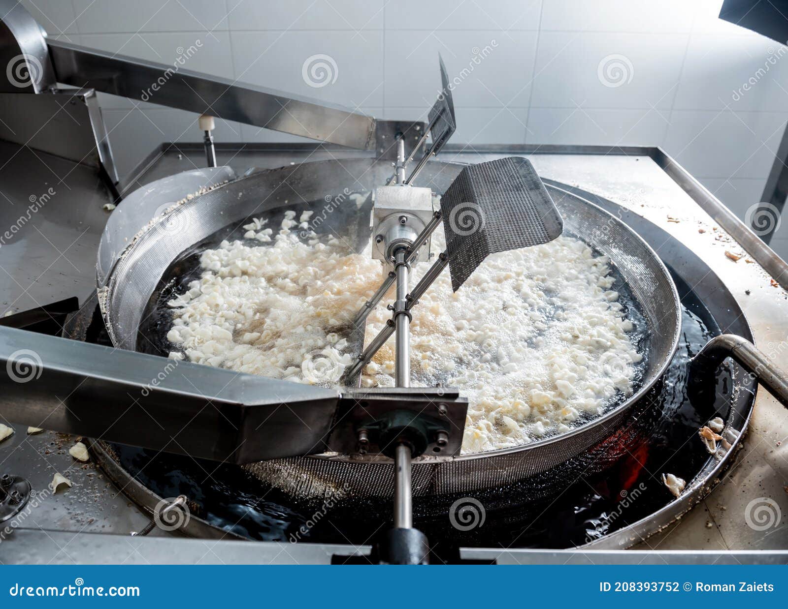Conveyor Line for Frying Snacks and Chips in a Modern Factory Stock ...
