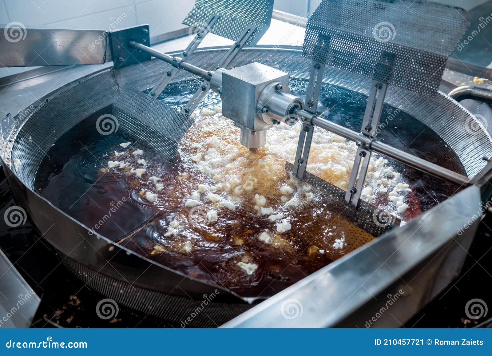Conveyor Line for Frying Snacks and Chips in a Modern Factory Stock ...