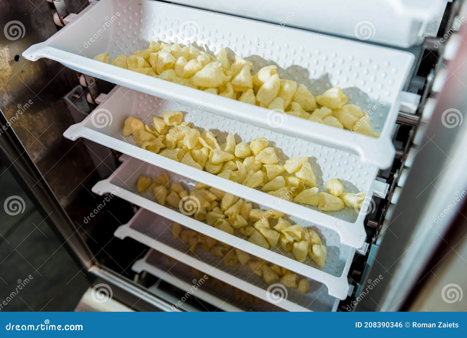 Conveyor Line for Packing Snacks and Chips in a Modern Factory Stock ...