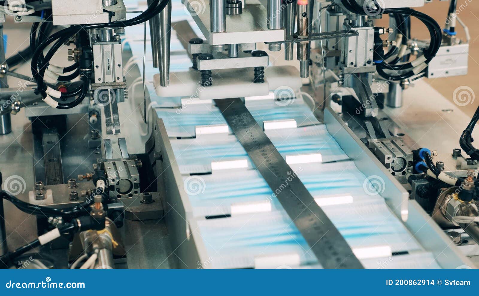 Conveyor Machine is Fabricating and Transporting Face Masks. Covid-19 ...