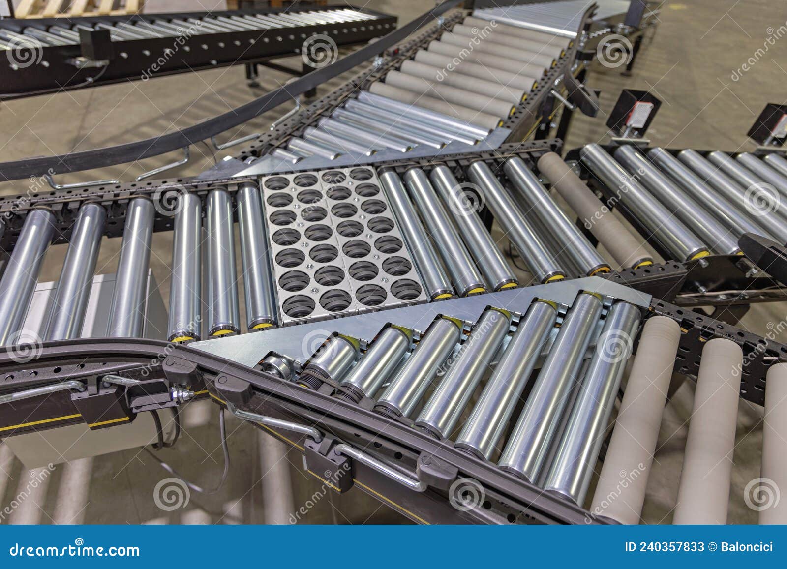 Conveyor Transfer Wheels Intersection Stock Image - Image of industrial ...
