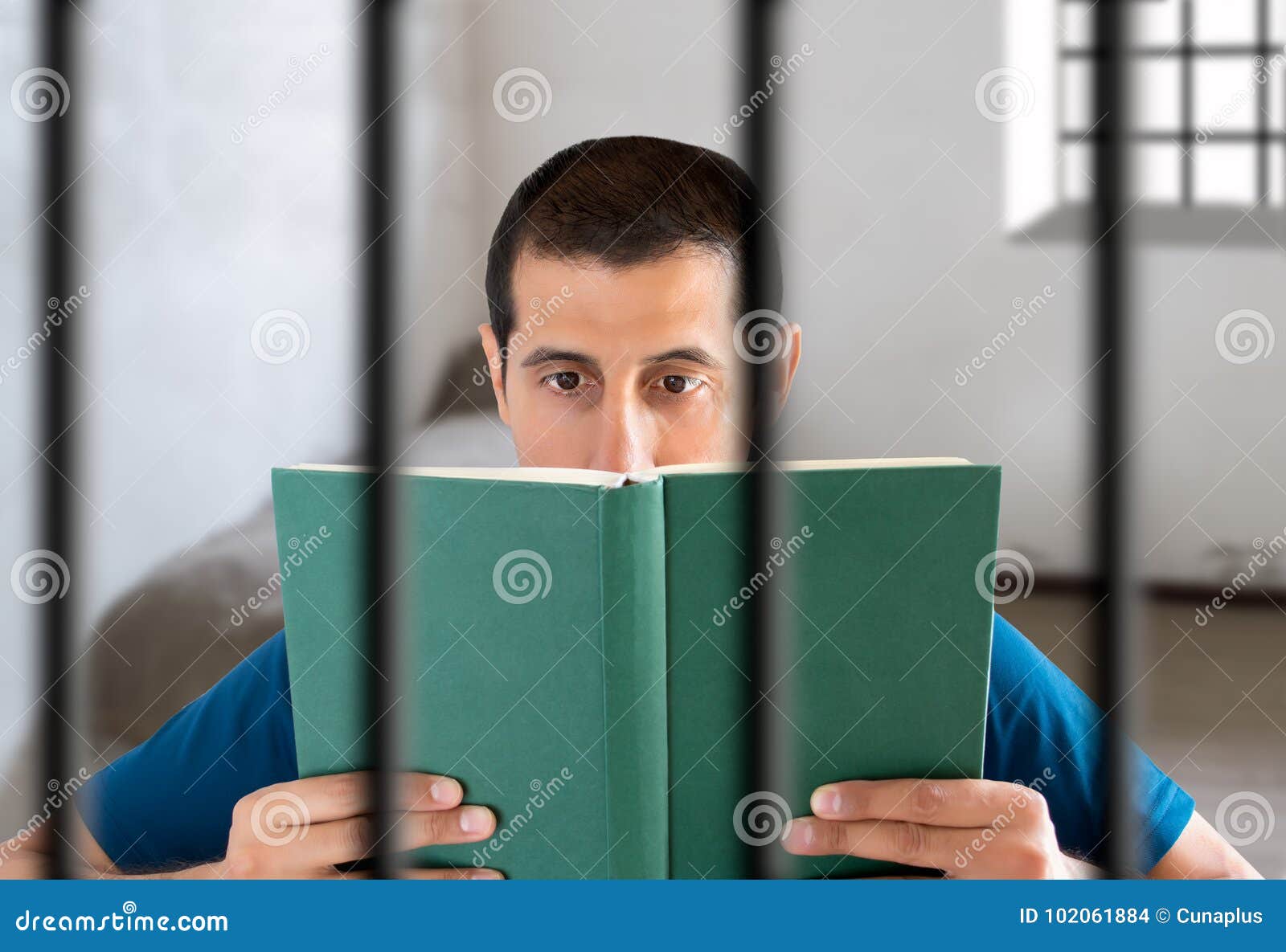 Convict reading a book stock photo. Image of latin, prisoner - 102061884