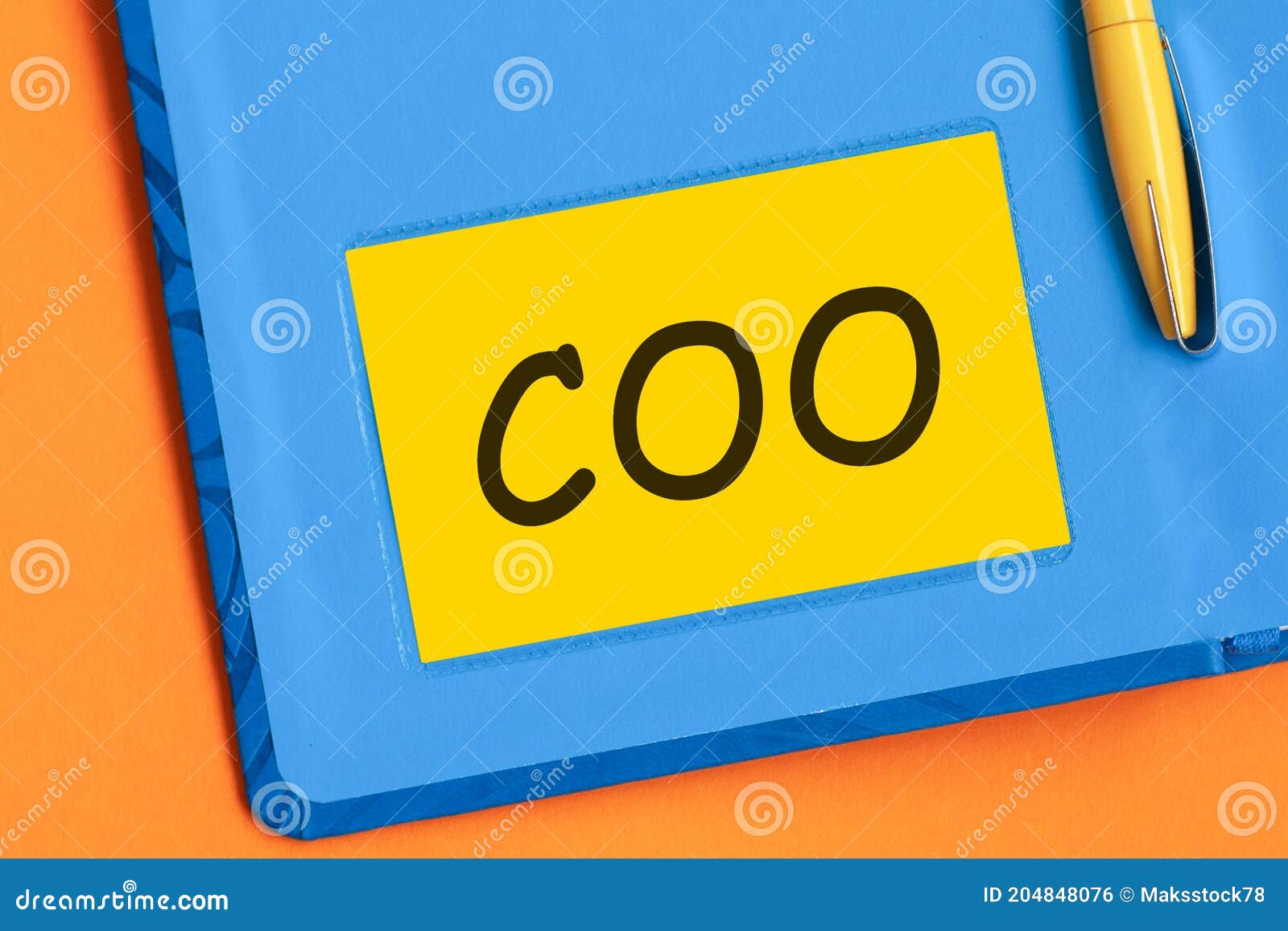 COO the Word is Written in Black Letters on the Yellow Paper for Notes ...
