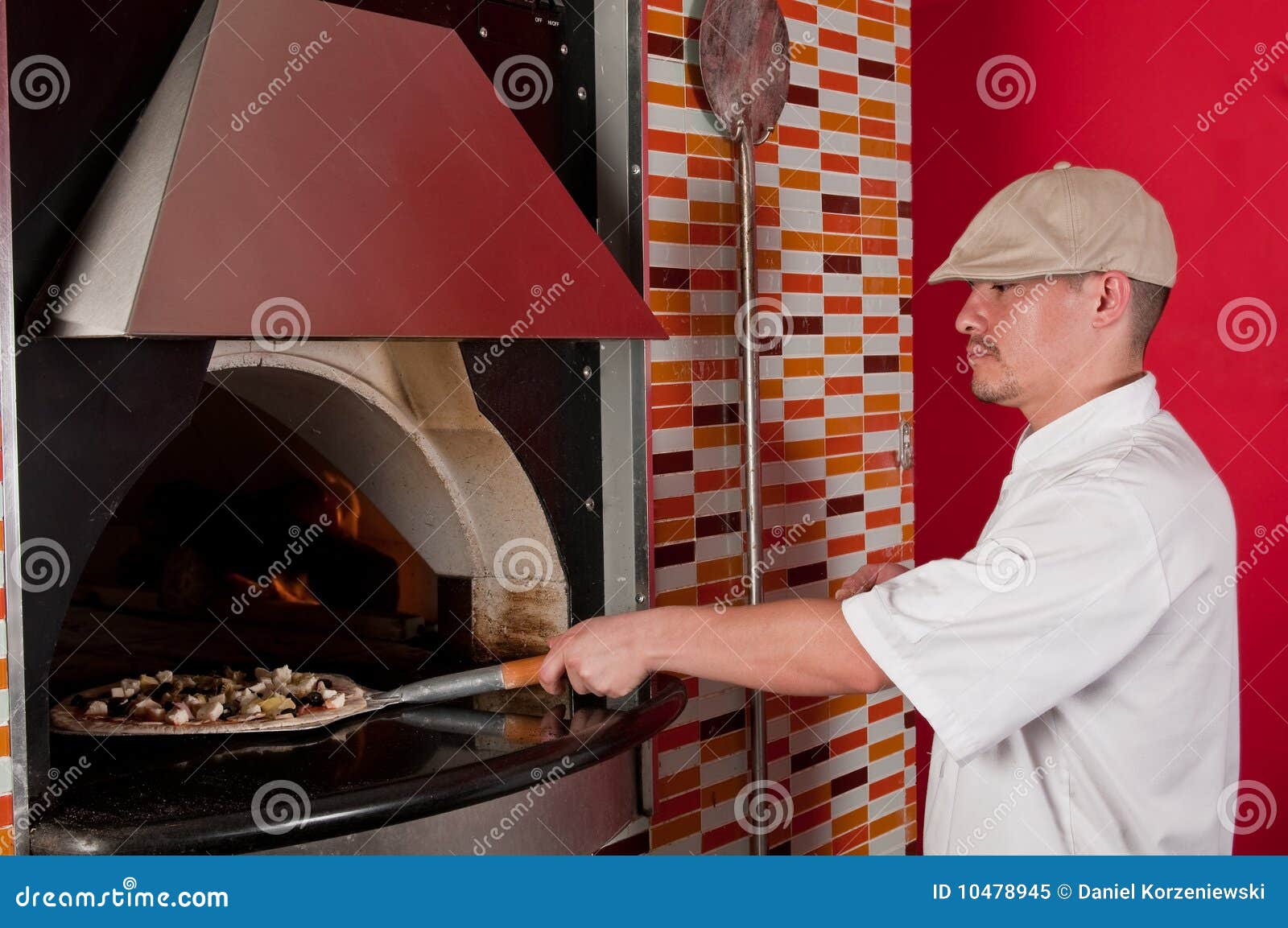 Cook baking pizza stock image. Image of board, flame - 10478945