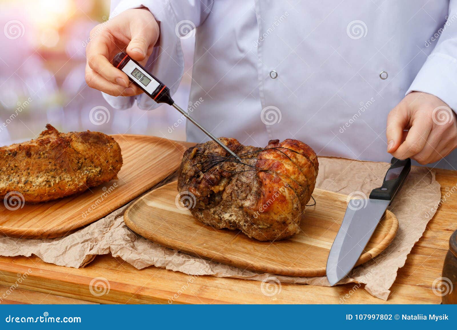 Cook Checks the Readiness of the Meat . Stock Photo - Image of roast ...