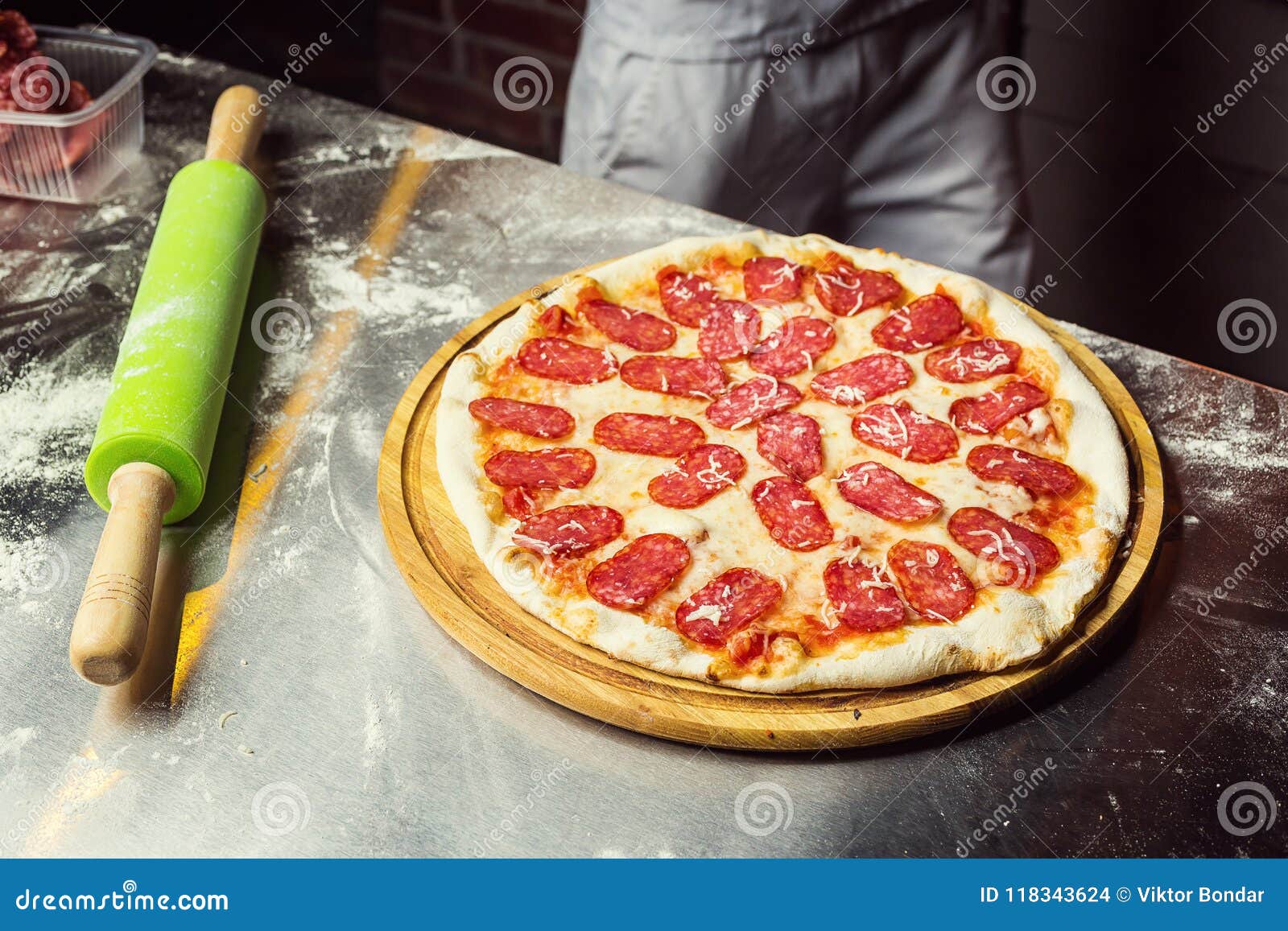Cook Chef Making Delicious Pizza at the Restaurant, Close-up Stock ...