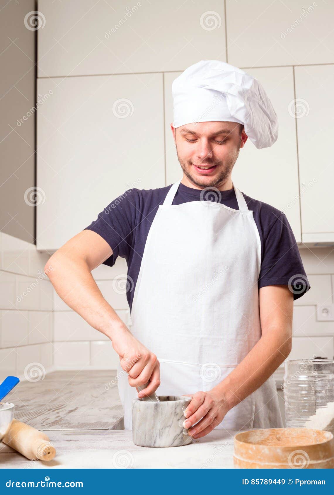 Cook chef with a mortar stock image. Image of kitchen - 85789449