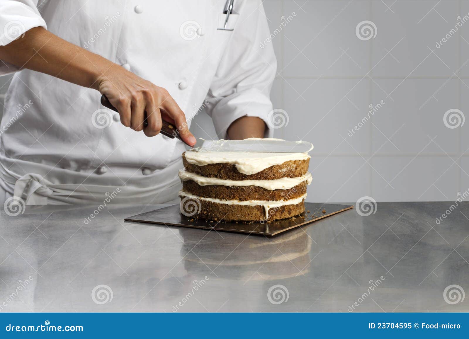 Cook Coating a Cake with Cream Stock Image - Image of coat, pastry ...