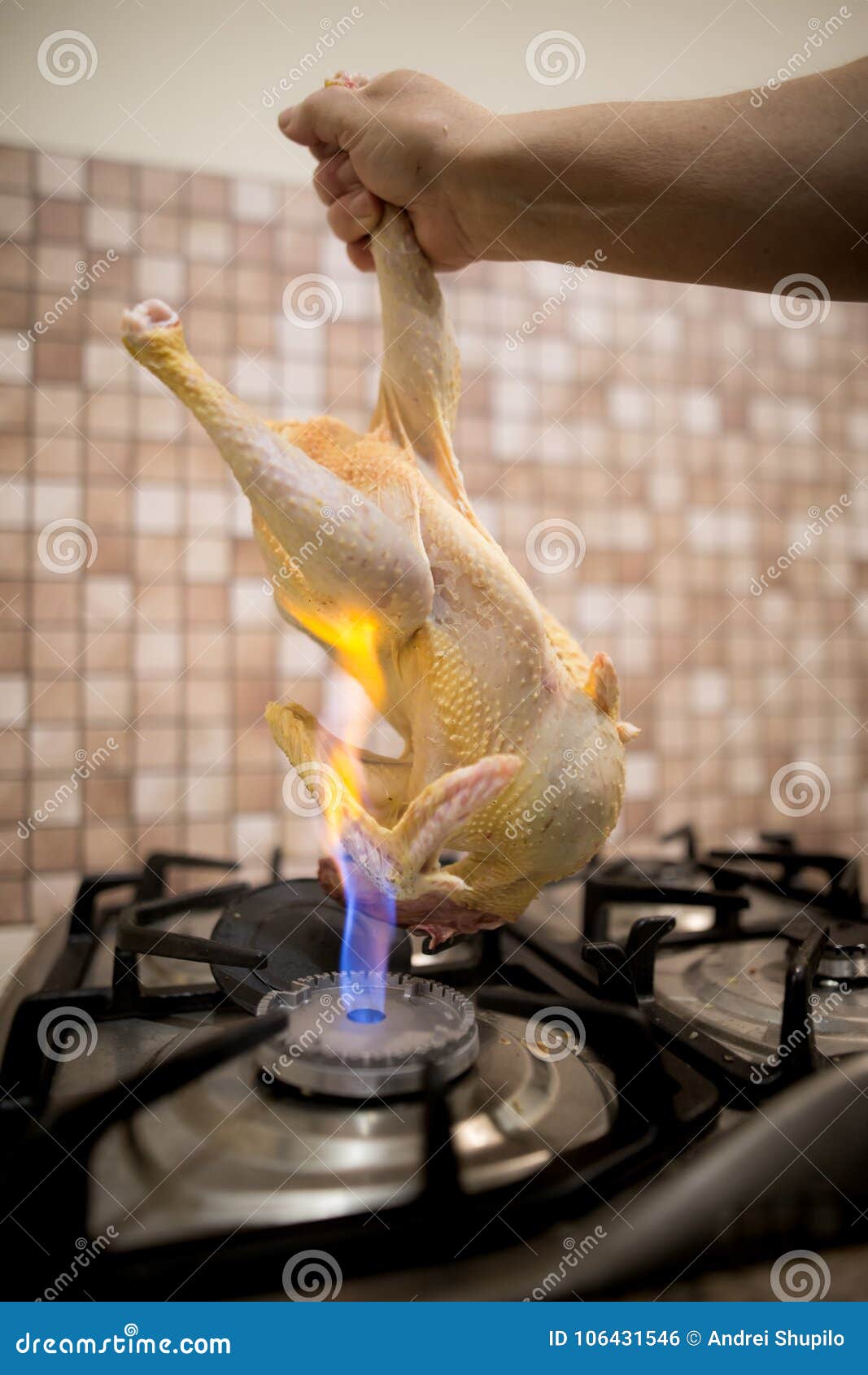 The Cook Cuts the Chicken on Fire Stock Photo - Image of meat, roasted ...