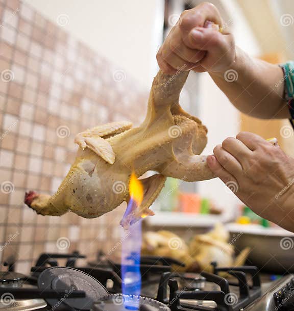 The Cook Cuts the Chicken on Fire Stock Image - Image of fresh, cooking ...